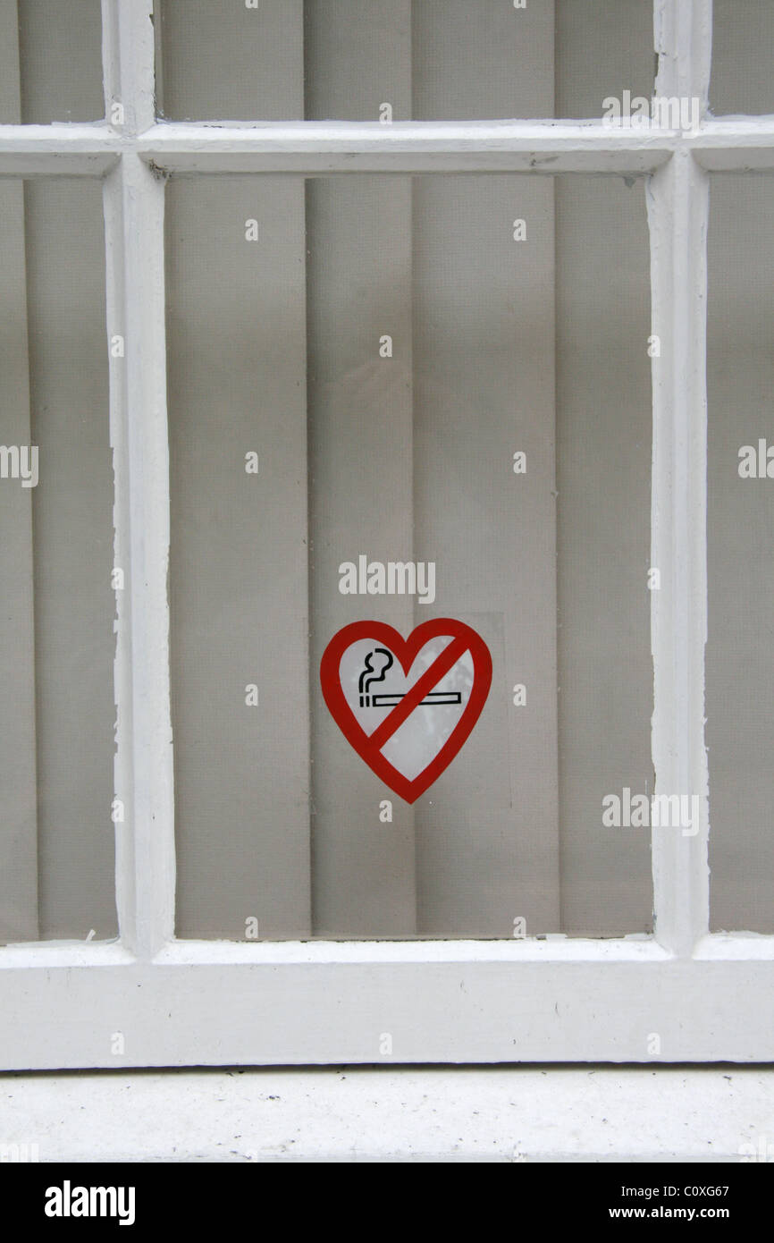 no smoking sign sticker in window Stock Photo - Alamy