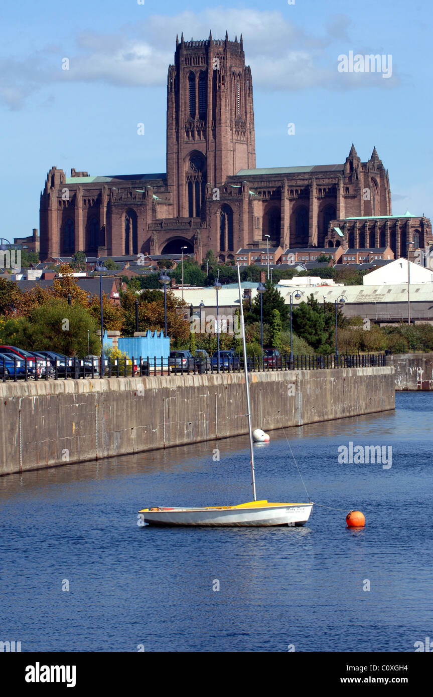 A sailing boat in Liverpool Marina with Liverpool Anglican Cathedral in ...