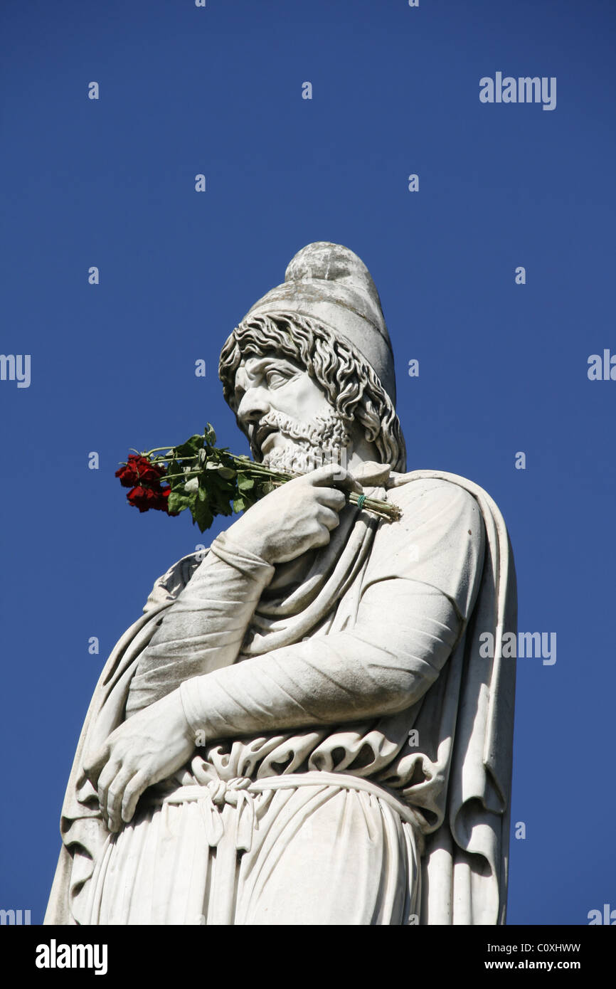 statue with red rose in piazza del popolo square in rome Stock Photo ...
