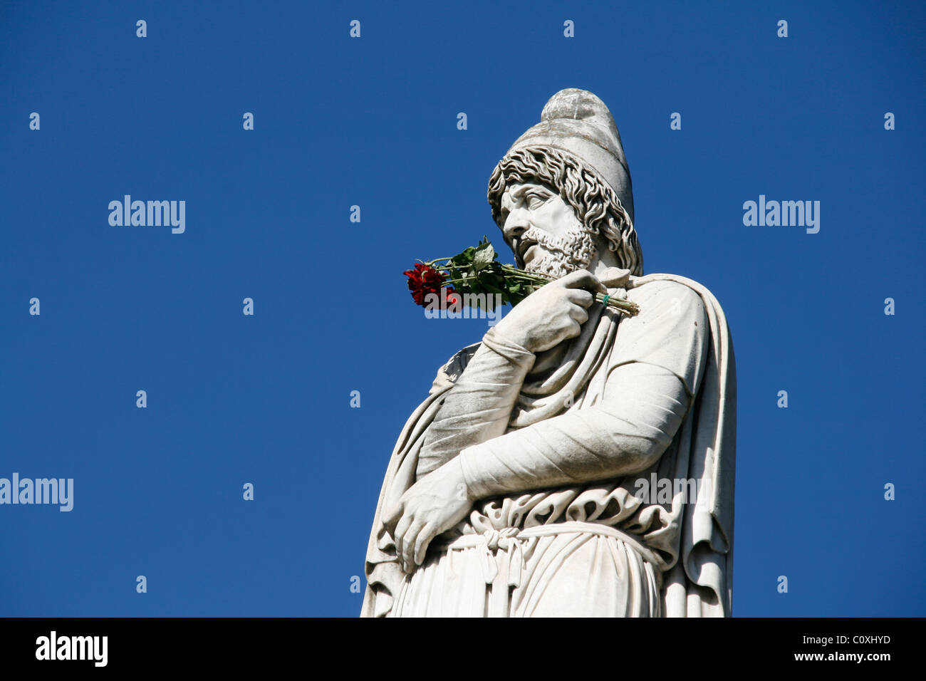statue with red rose in piazza del popolo square in rome Stock Photo ...