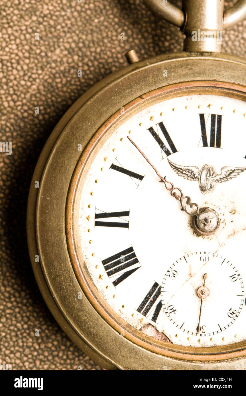 old broken pocket watch Stock Photo - Alamy