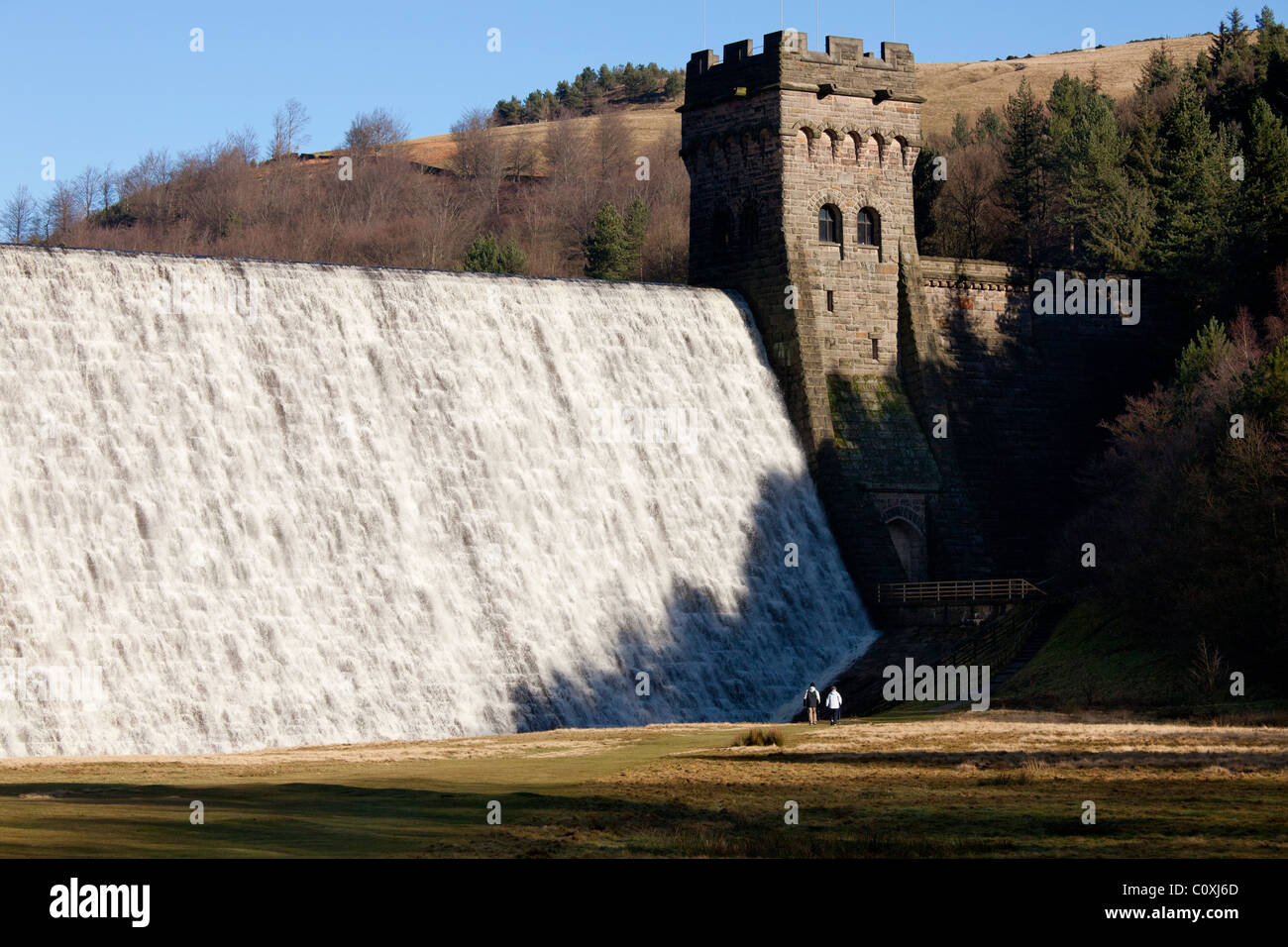 Water flowing down Howden Dam at Upper Derwent Valley Reservoir in the ...
