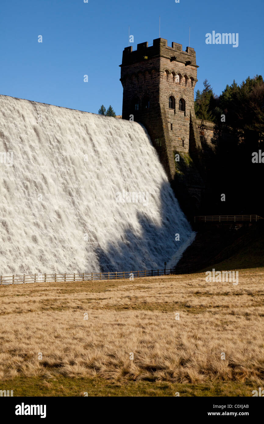 Water flowing down Howden Dam at Upper Derwent Valley Reservoir in the ...