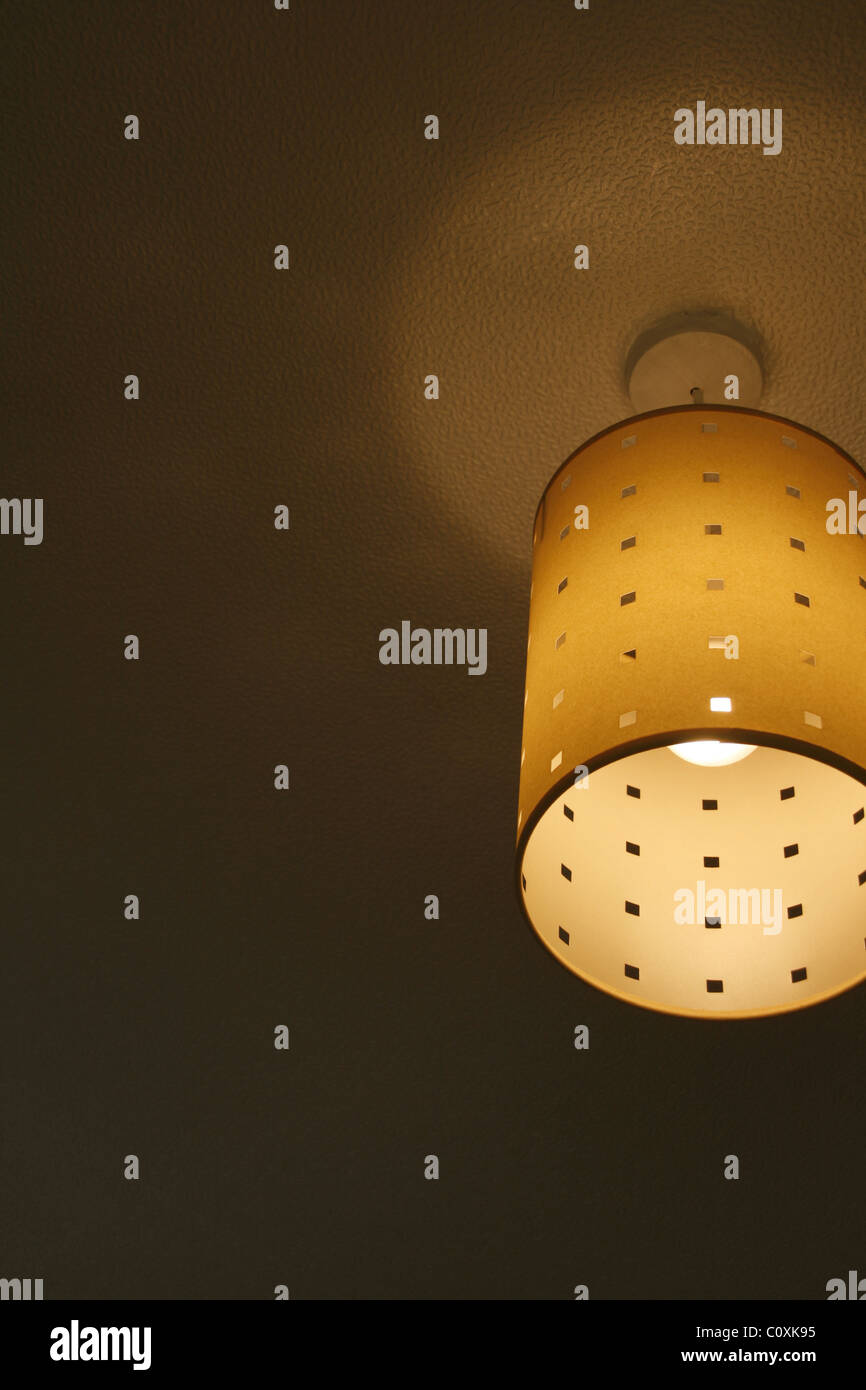 bright light bulb on ceiling in room Stock Photo - Alamy