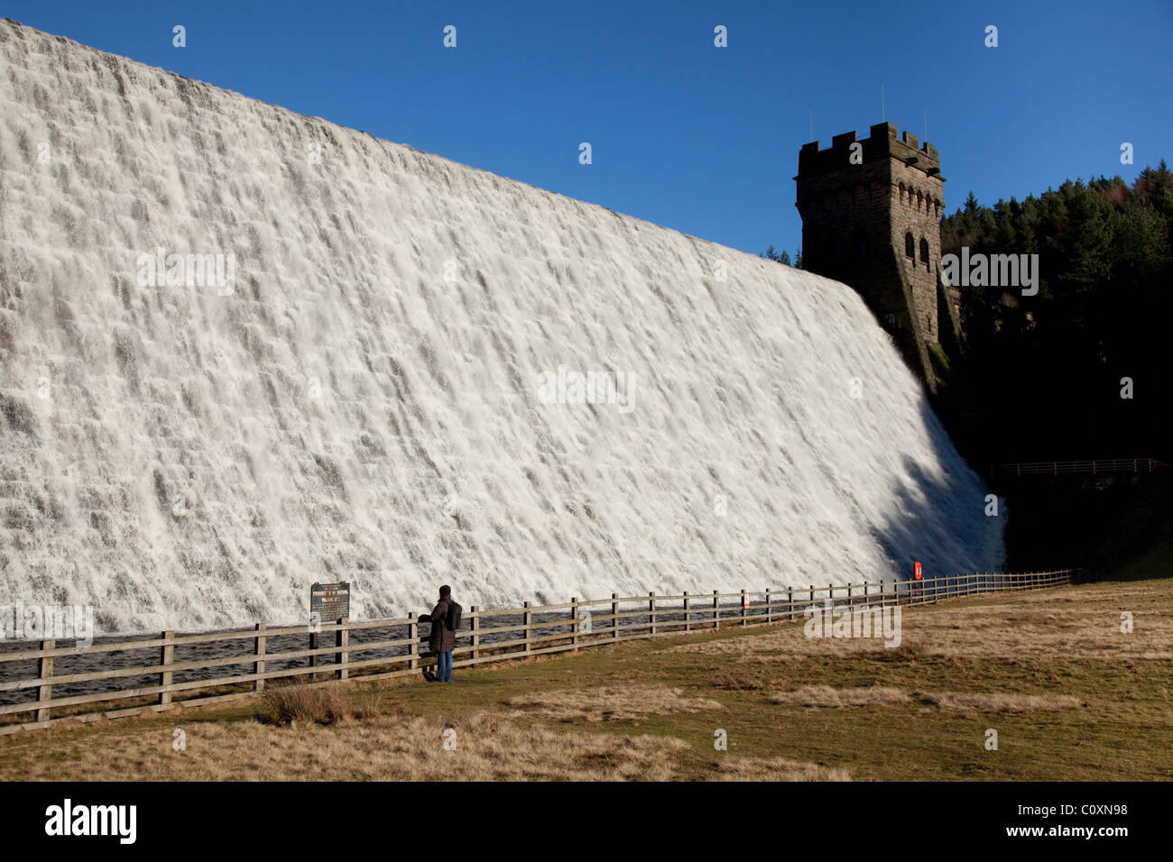 Water flowing down Howden Dam at Upper Derwent Valley Reservoir in the ...