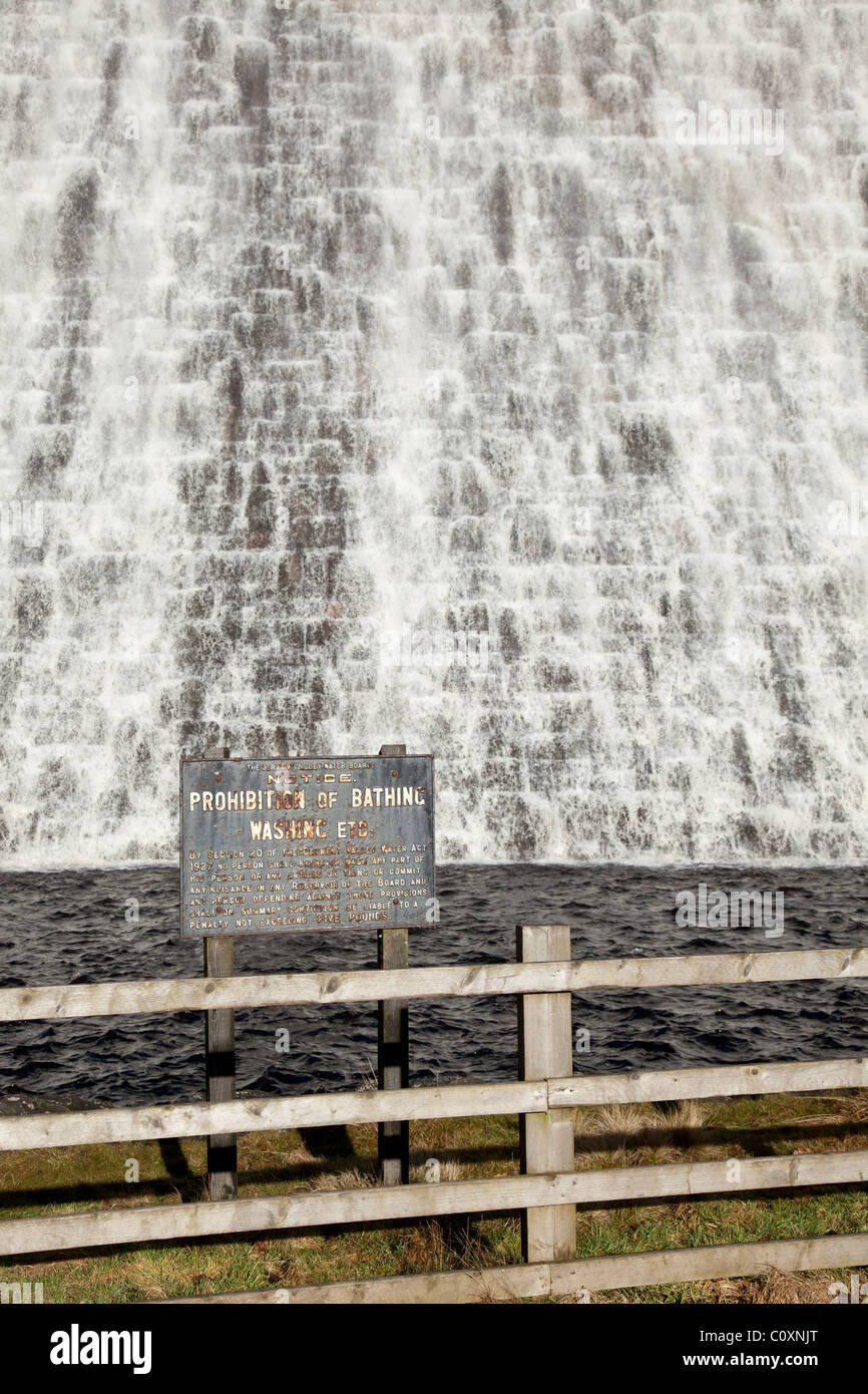 Water flowing down Howden Dam at Upper Derwent Valley Reservoir in the ...