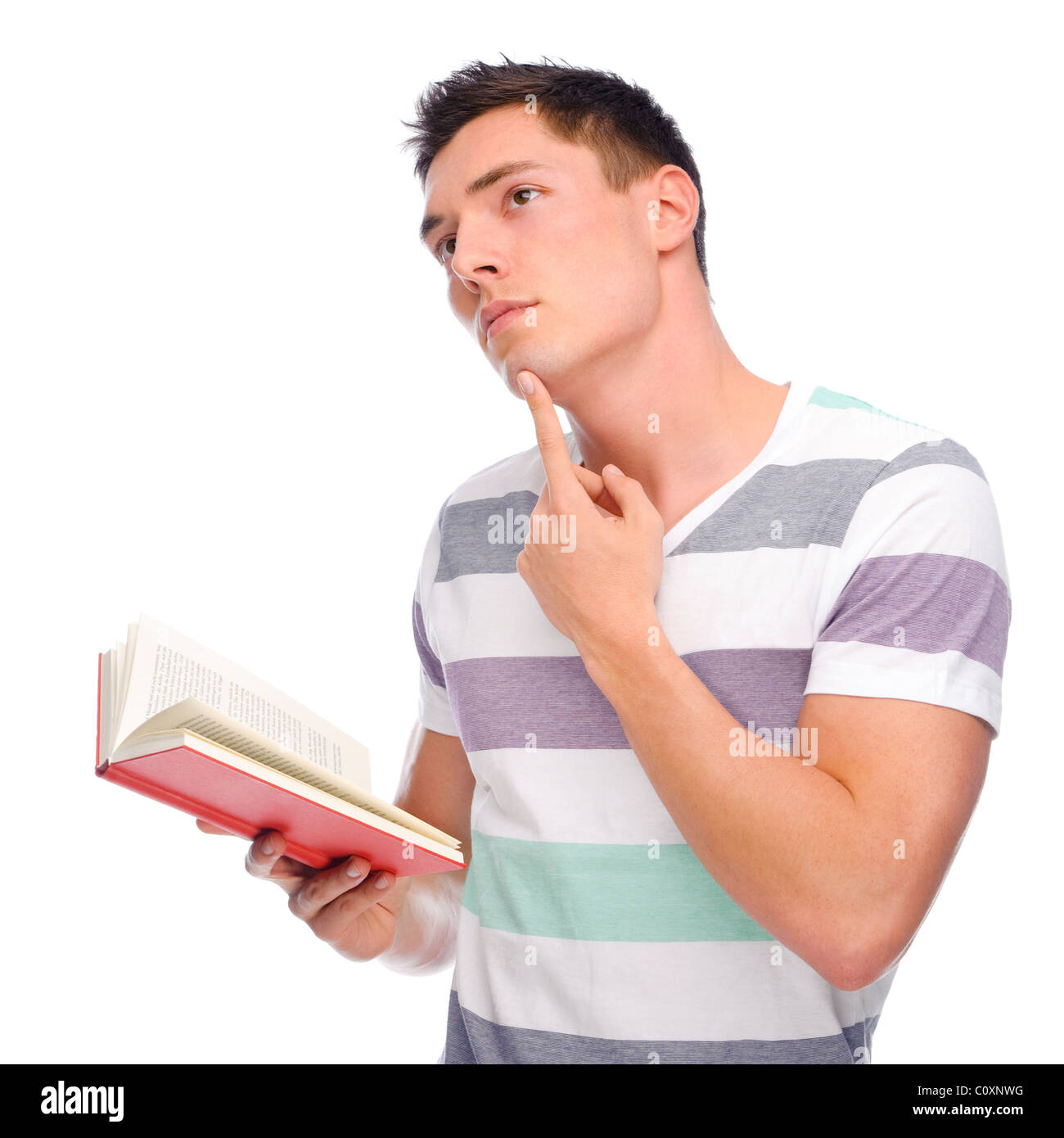Full isolated studio picture from a young man with book Stock Photo - Alamy