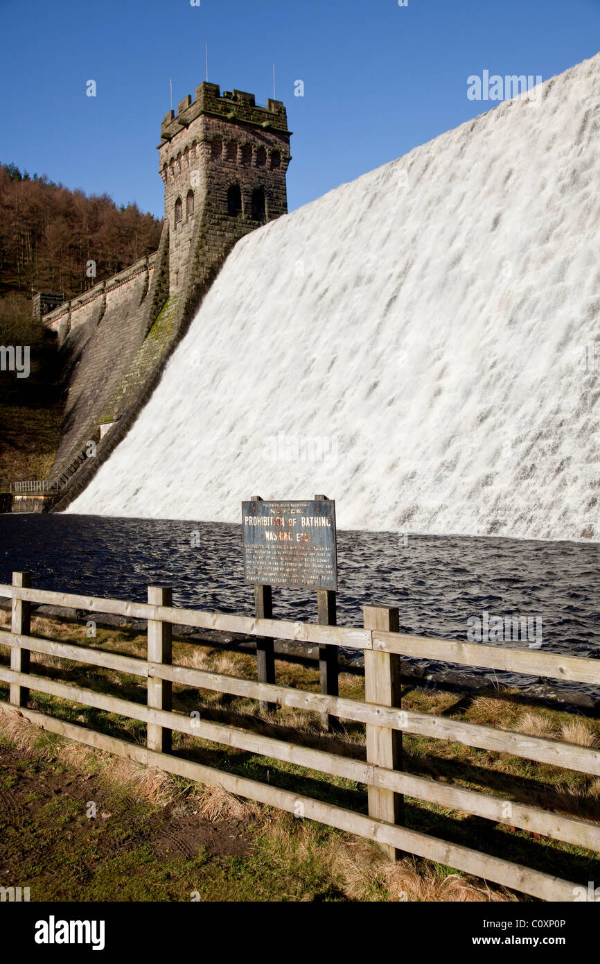 Water flowing down Howden Dam at Upper Derwent Valley Reservoir in the ...