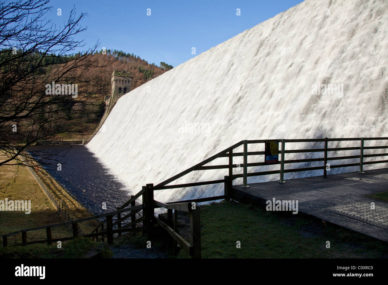 Water flowing down Howden Dam at Upper Derwent Valley Reservoir in the ...