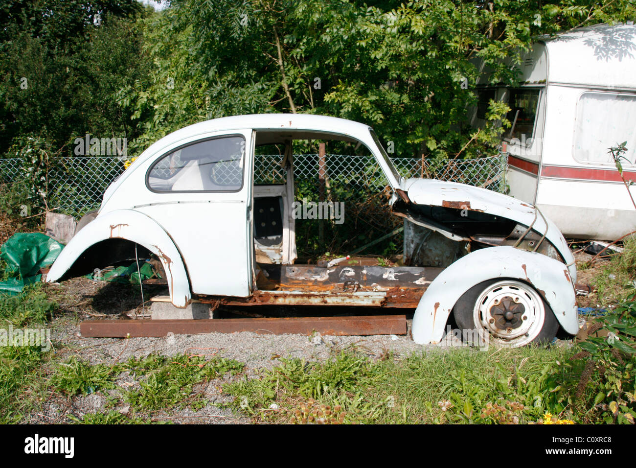 old car and caravan decaying in field in countryside Stock Photo - Alamy