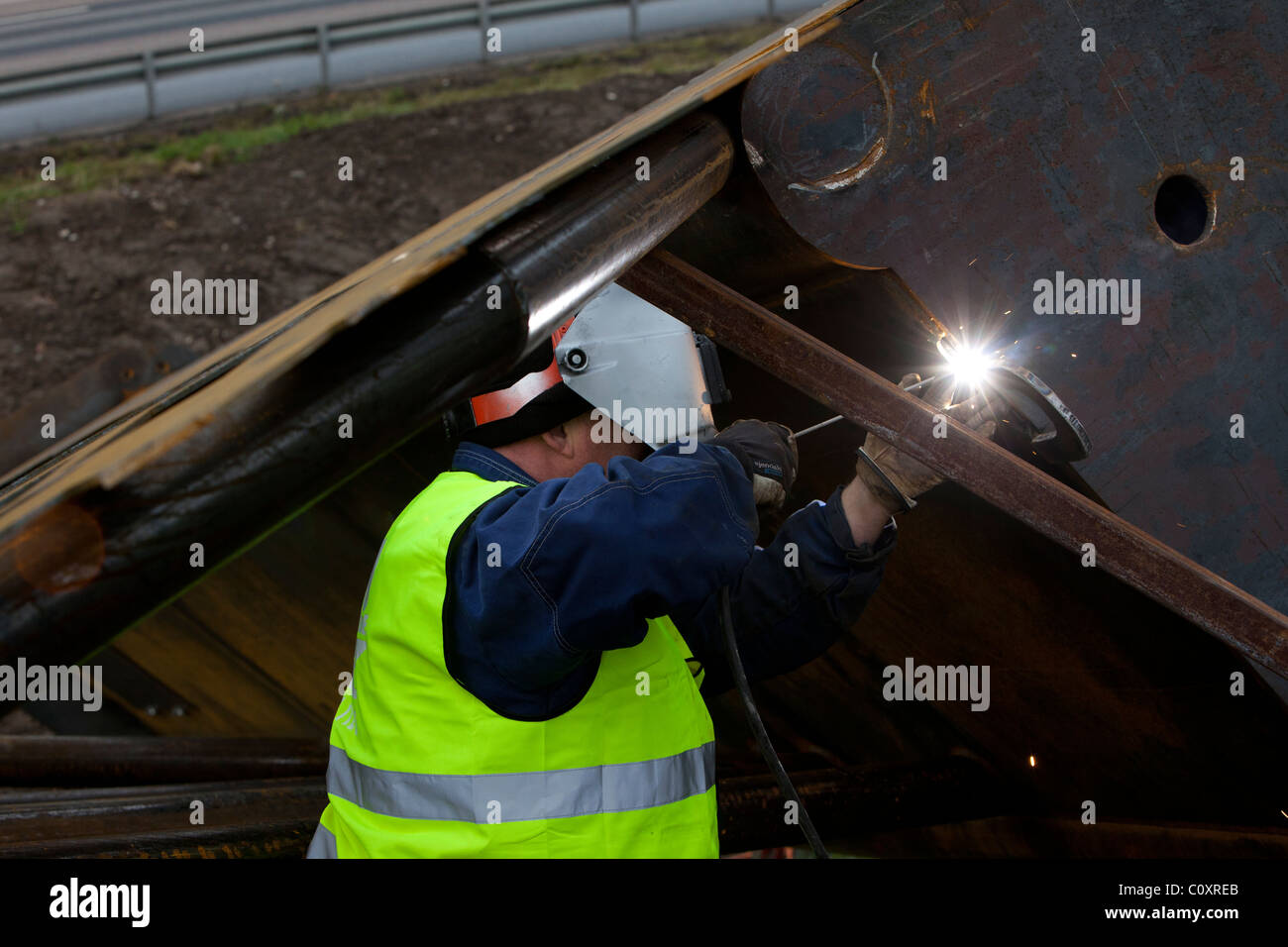 A man are welding Stock Photo - Alamy
