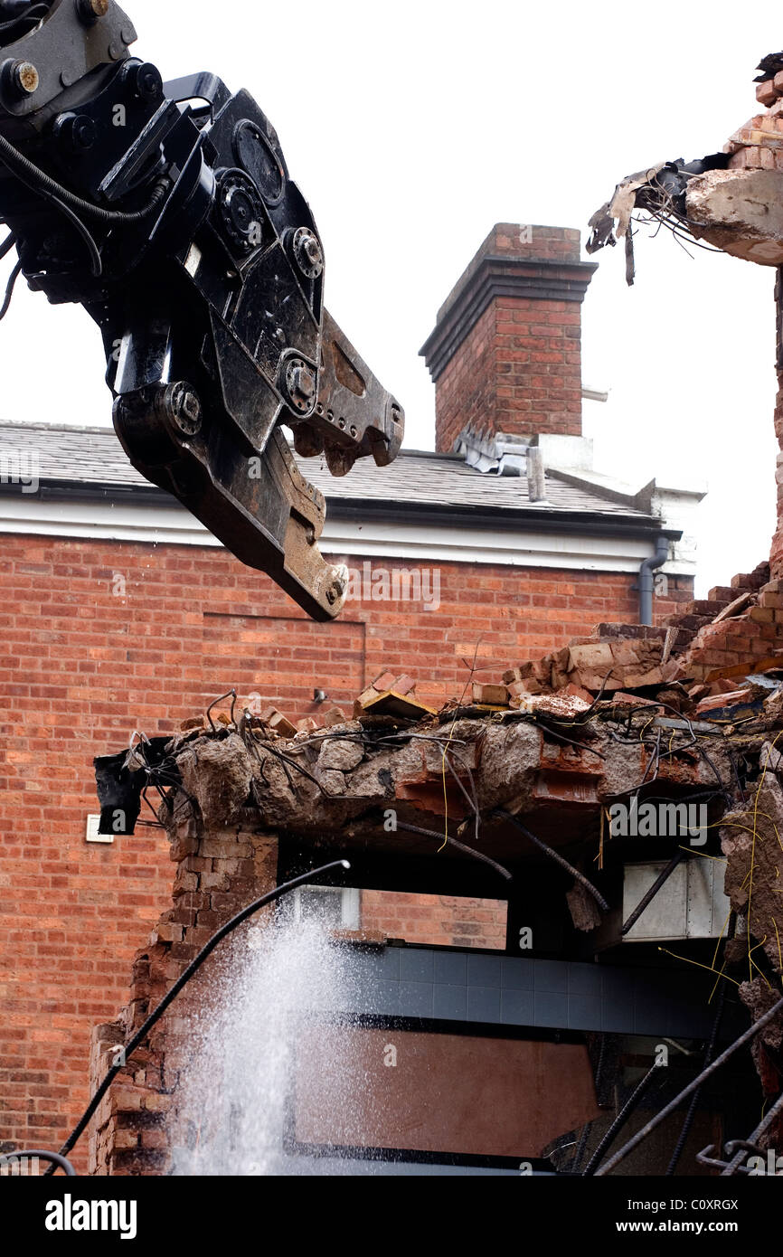 rubble from a building torn down by a demolition grab machine Stock ...