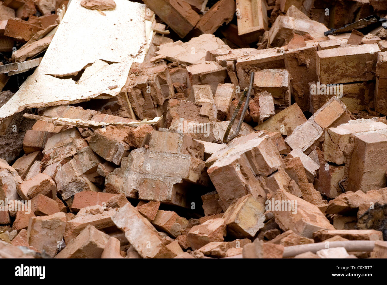 rubble from a building torn down by a demolition grab machine Stock ...