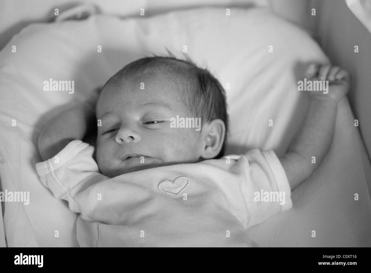 Newborn Baby Girl Behavior during her First days of Life Stock Photo ...
