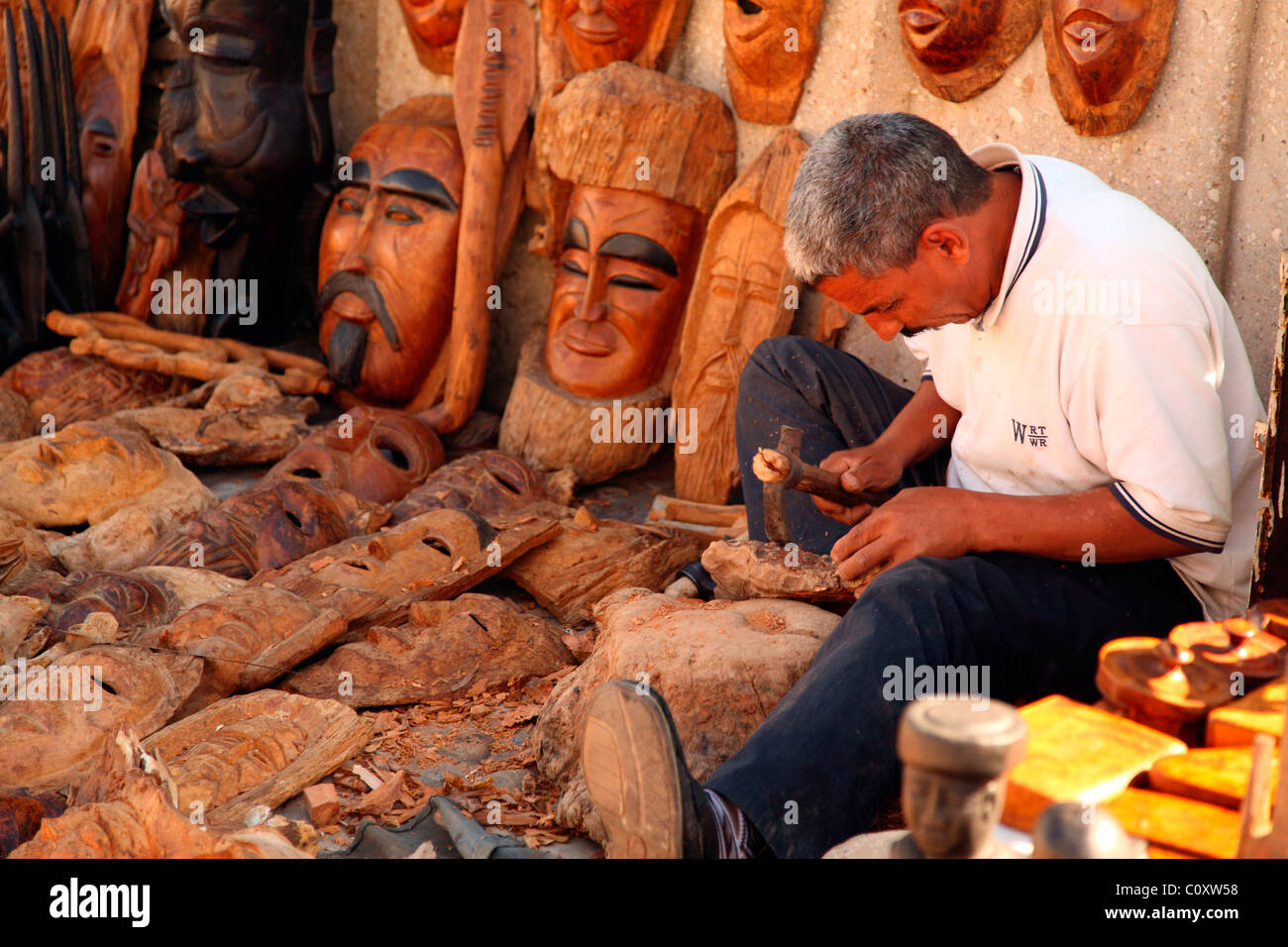 Moroccan craftsman working with wood in Agadir, Morocco Stock Photo - Alamy