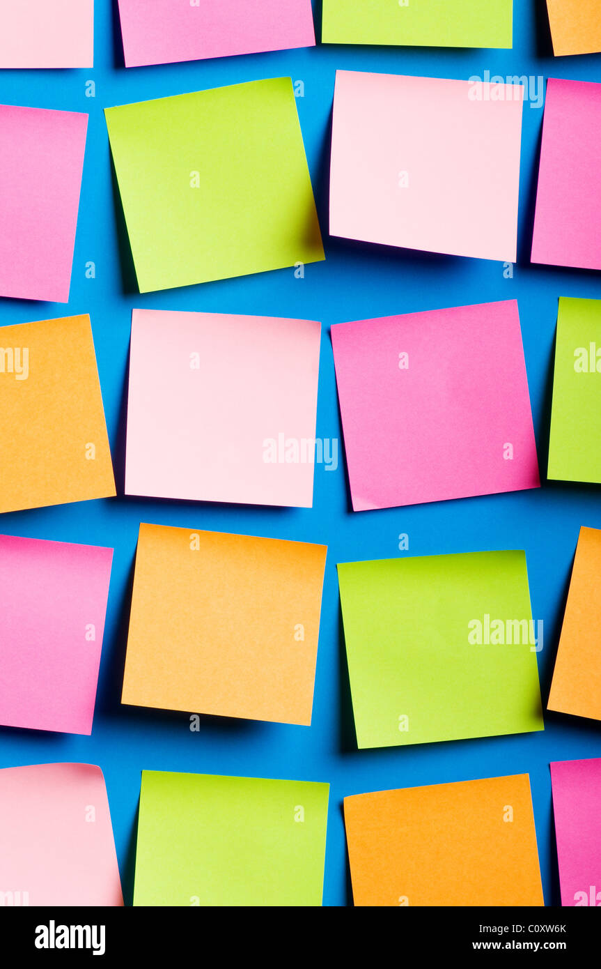 Reminder notes on the bright colorful paper Stock Photo - Alamy