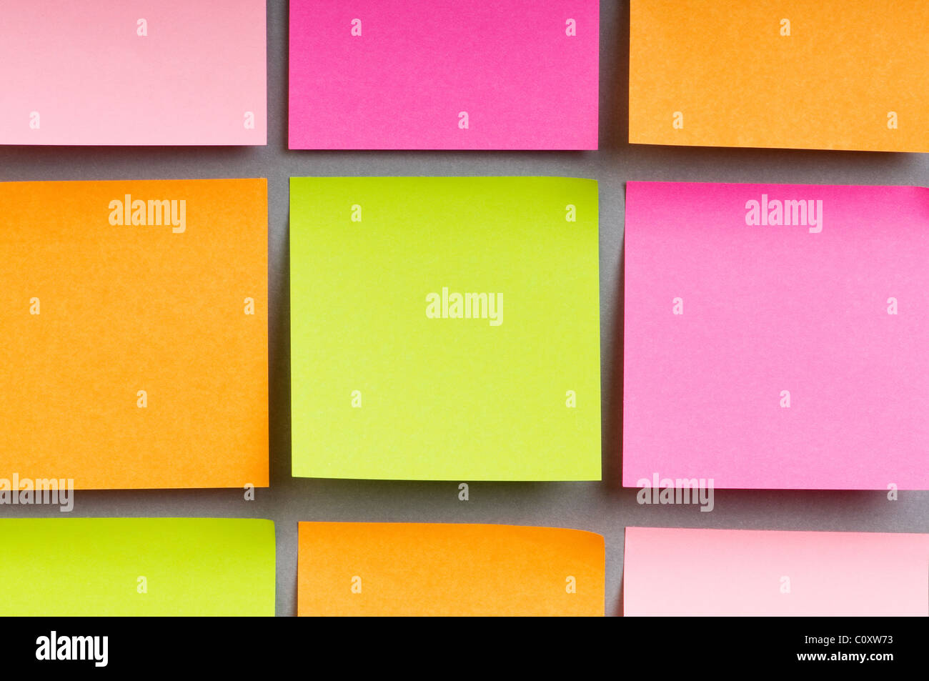 Reminder notes on the bright colorful paper Stock Photo - Alamy