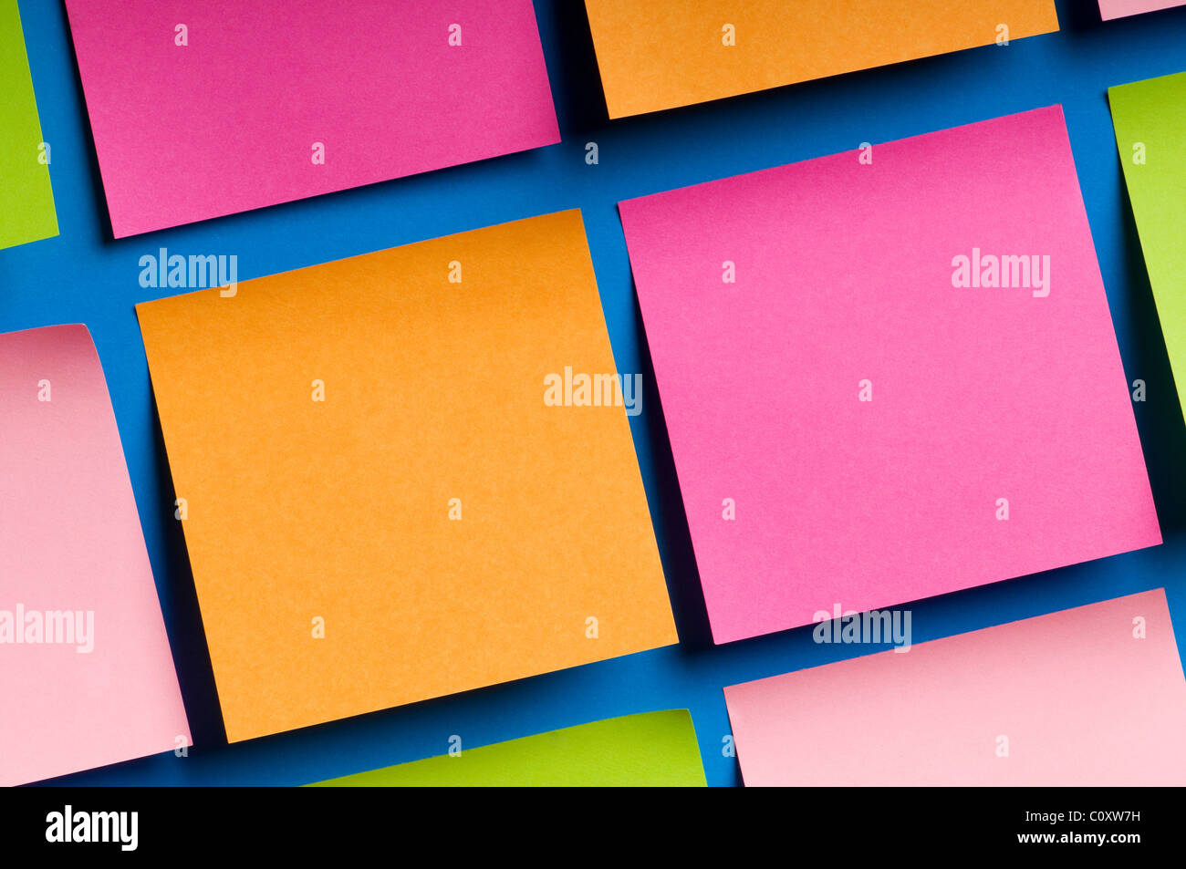 Reminder notes on the bright colorful paper Stock Photo - Alamy