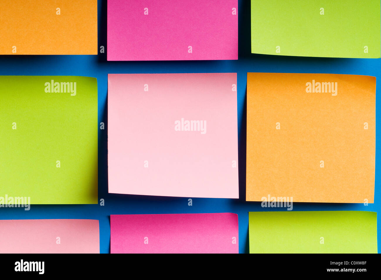 Reminder notes on the bright colorful paper Stock Photo - Alamy