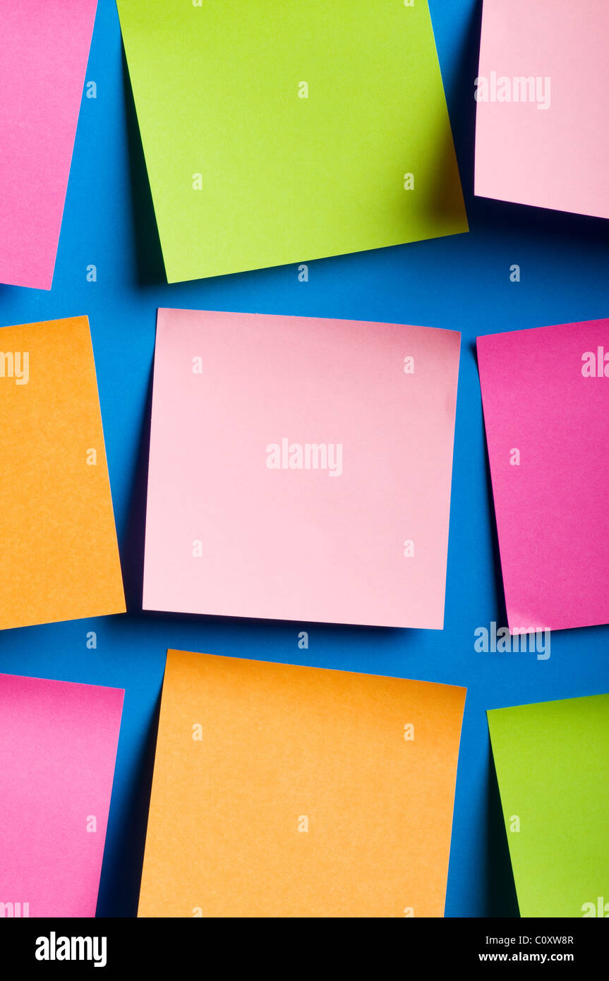Reminder notes on the bright colorful paper Stock Photo - Alamy