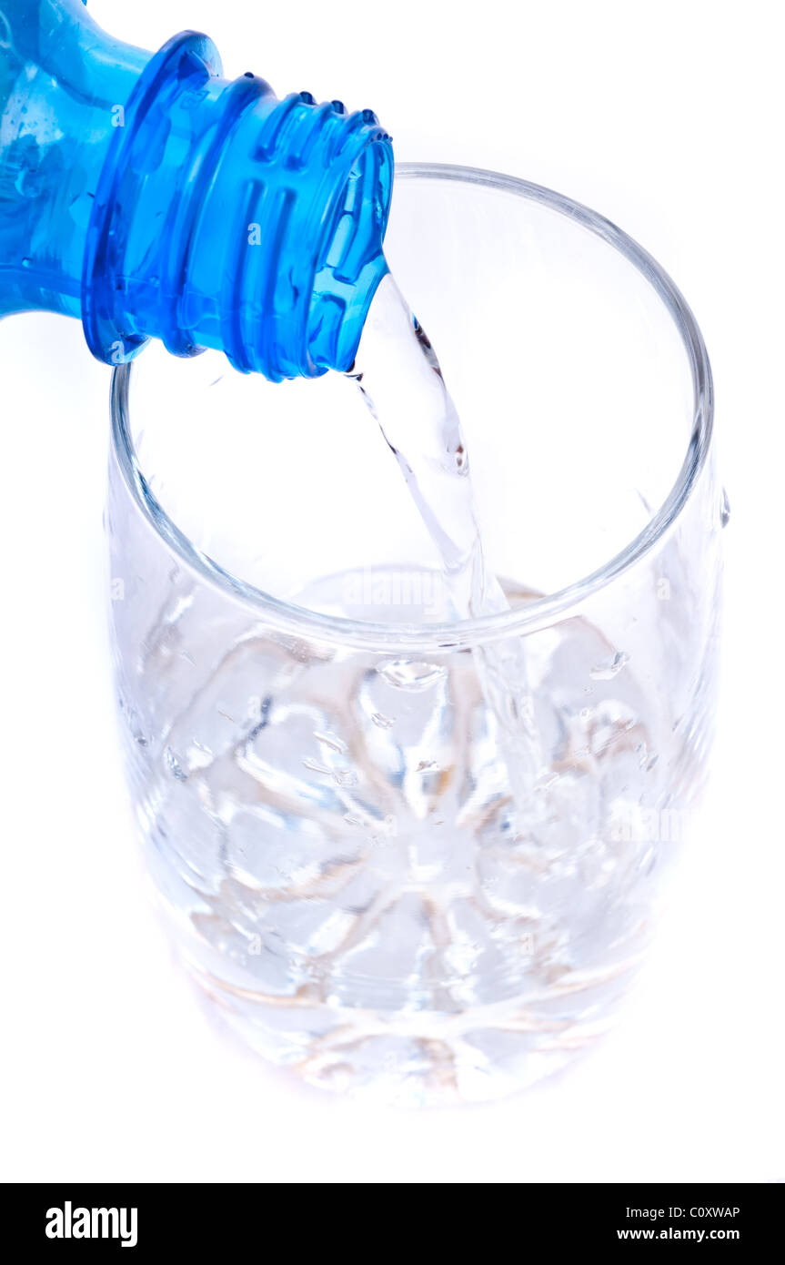 bottle pouring water into glass Stock Photo - Alamy