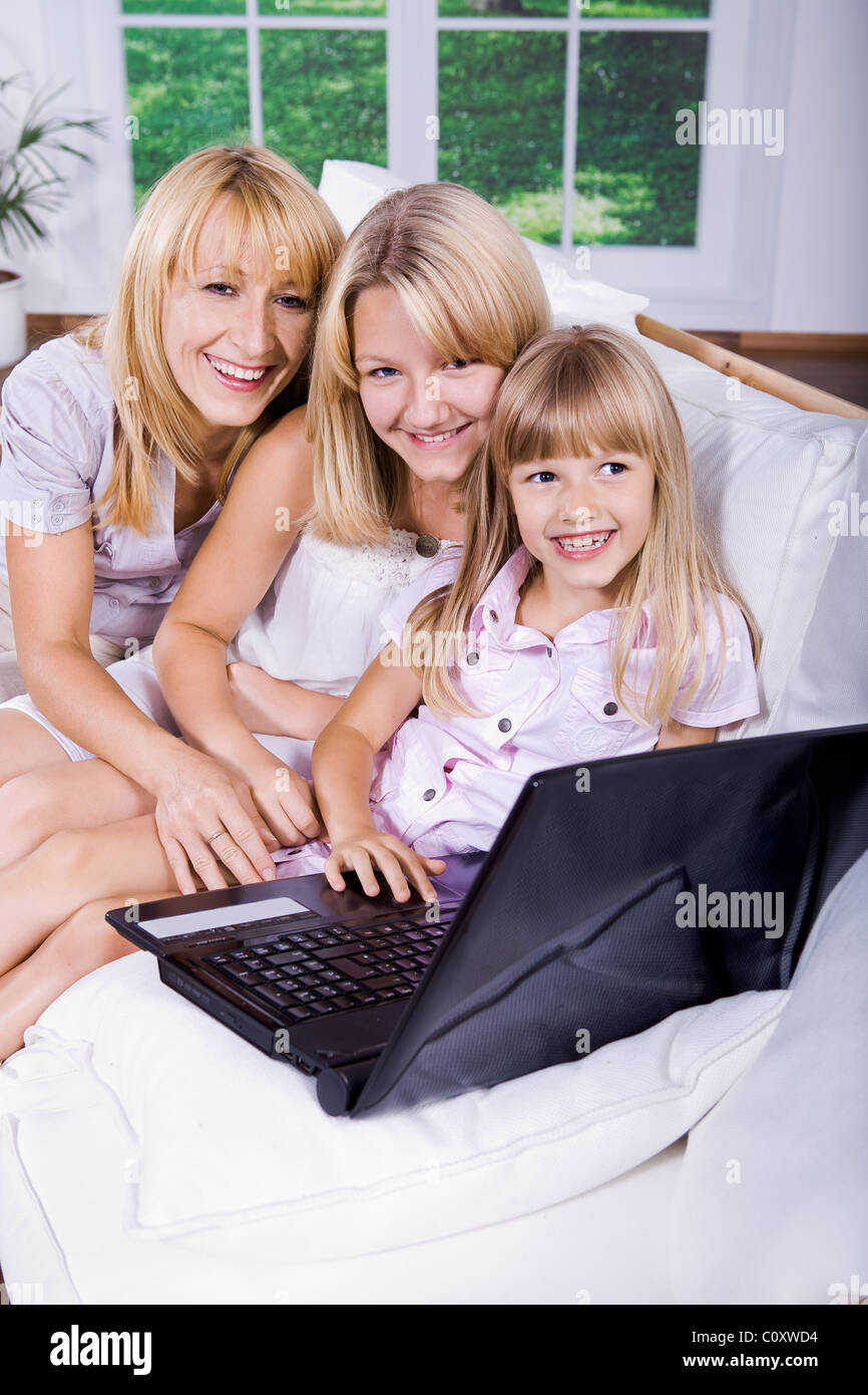 family with laptop Stock Photo - Alamy