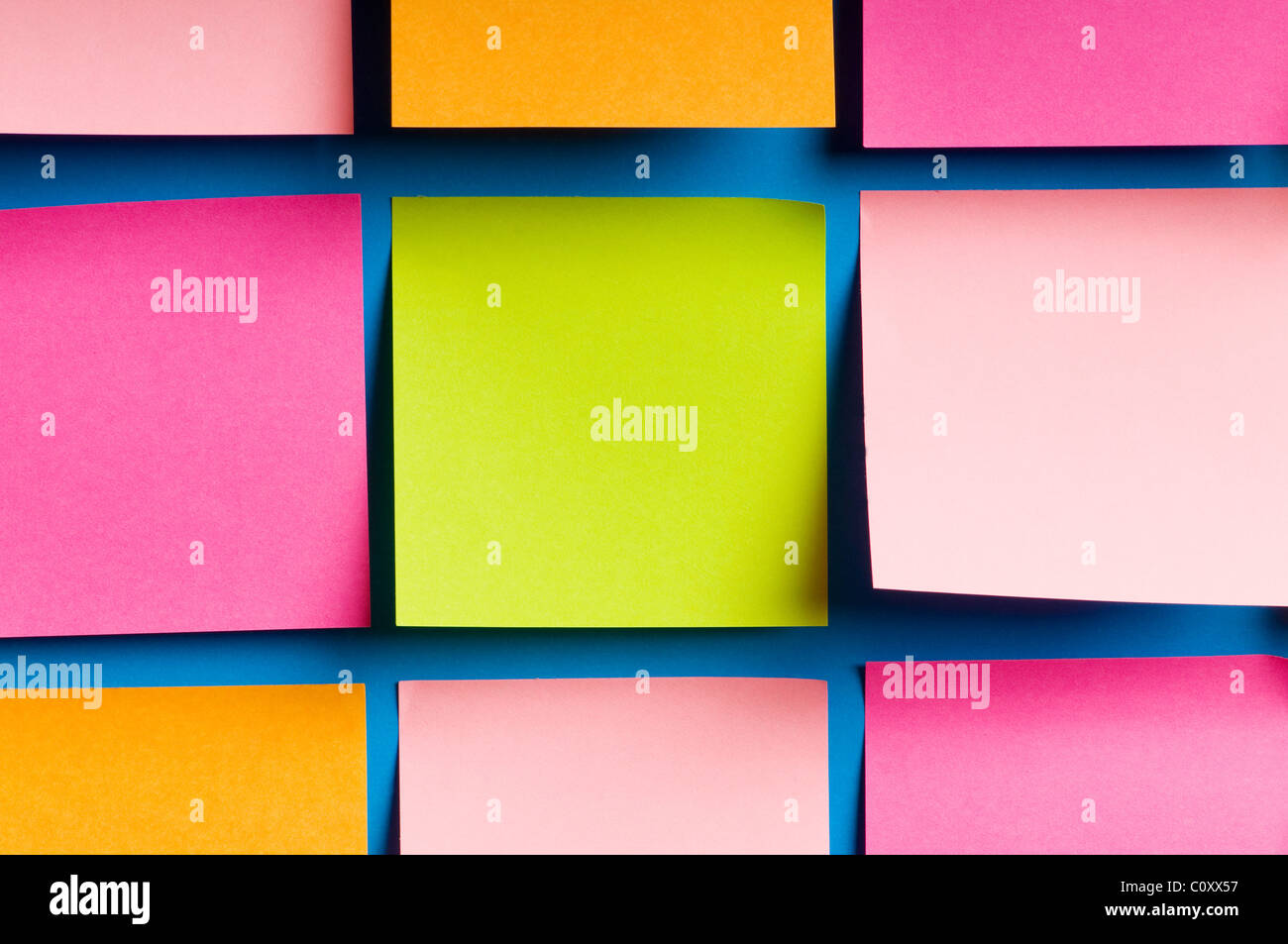 Reminder notes on the bright colorful paper Stock Photo - Alamy