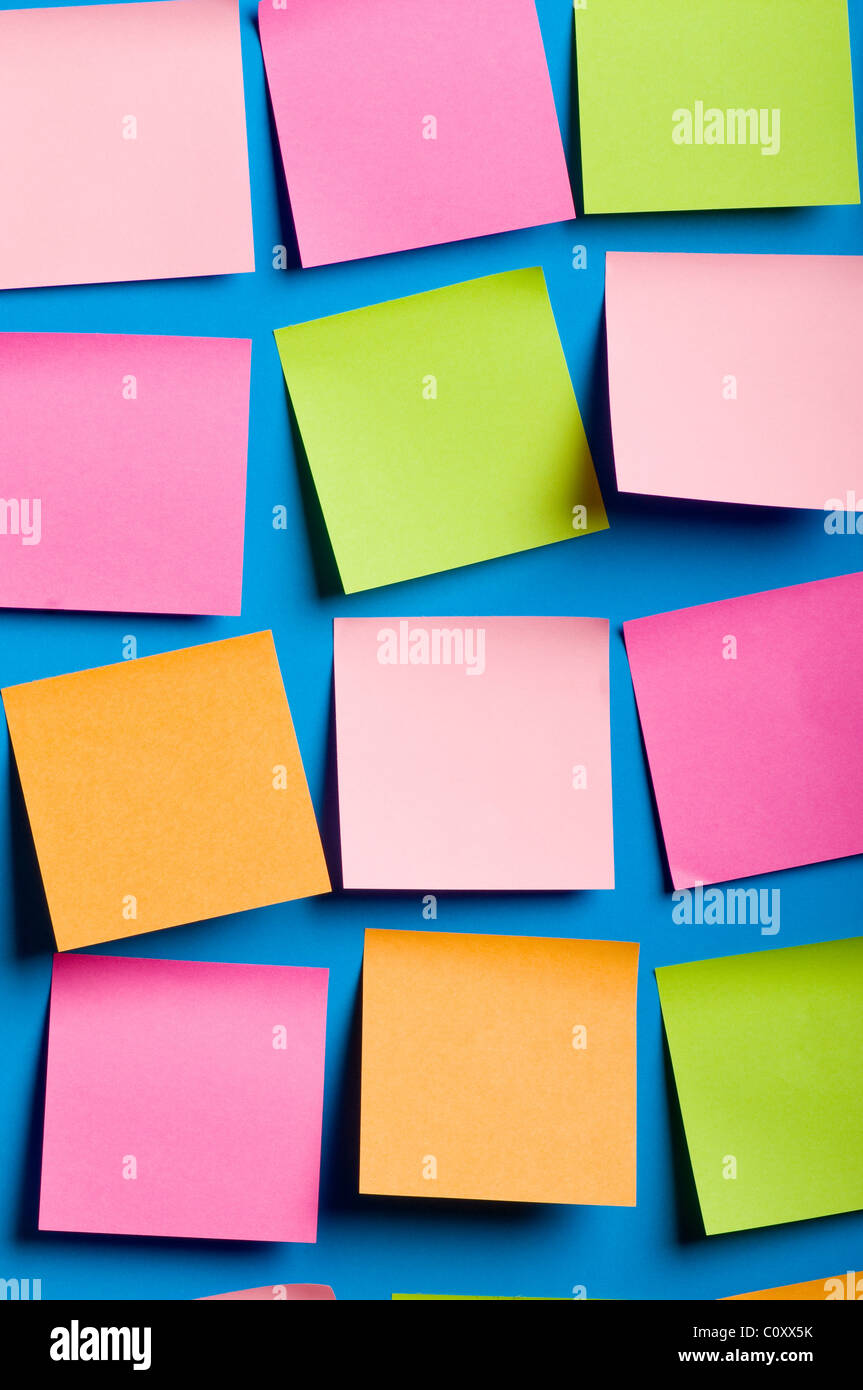 Reminder notes on the bright colorful paper Stock Photo - Alamy