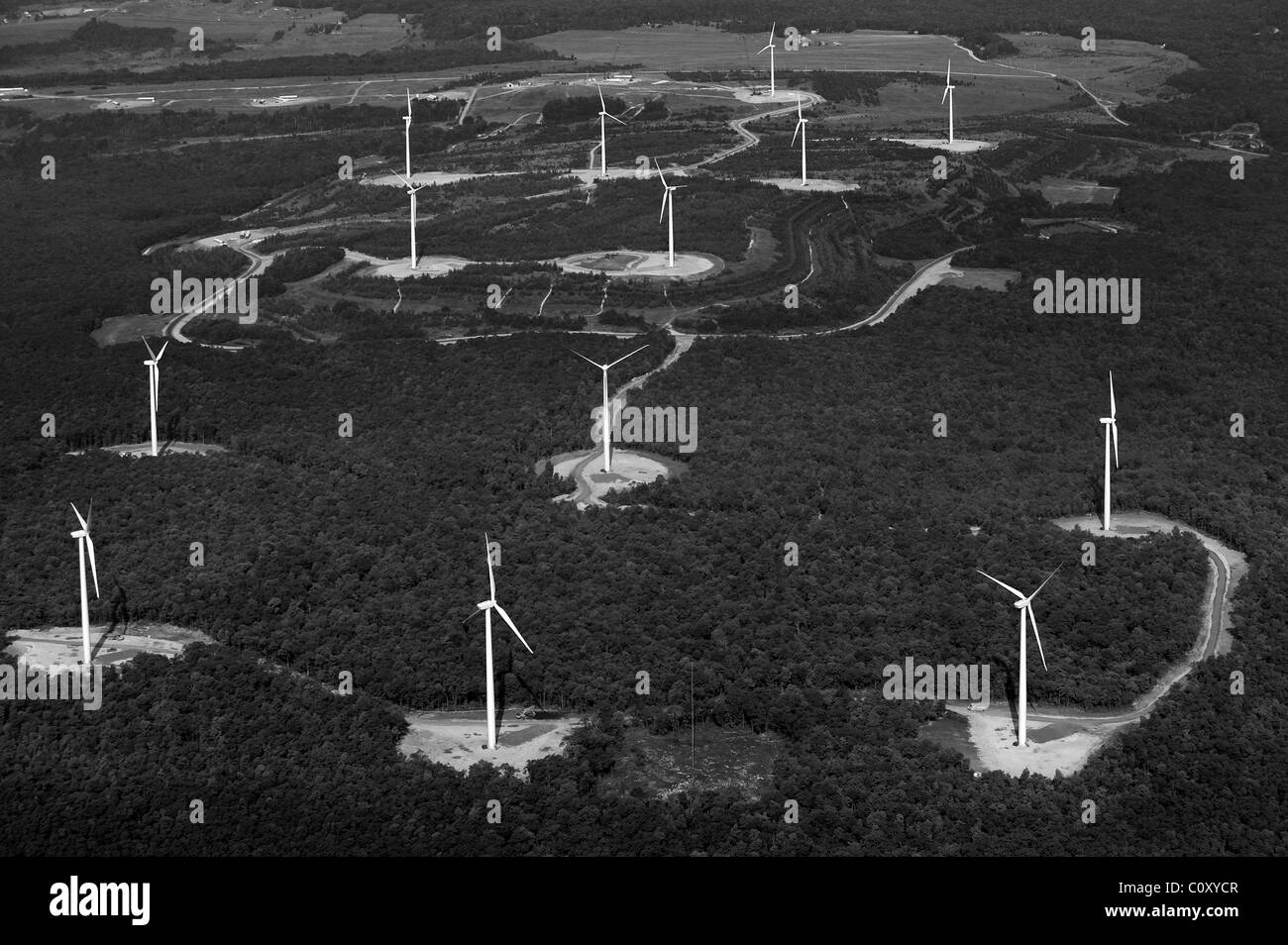 aerial view above wind turbines deciduous forest Appalachian mountains ...
