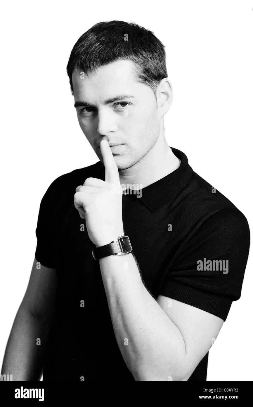 Handsome man finger on Black and White Stock Photos & Images - Alamy