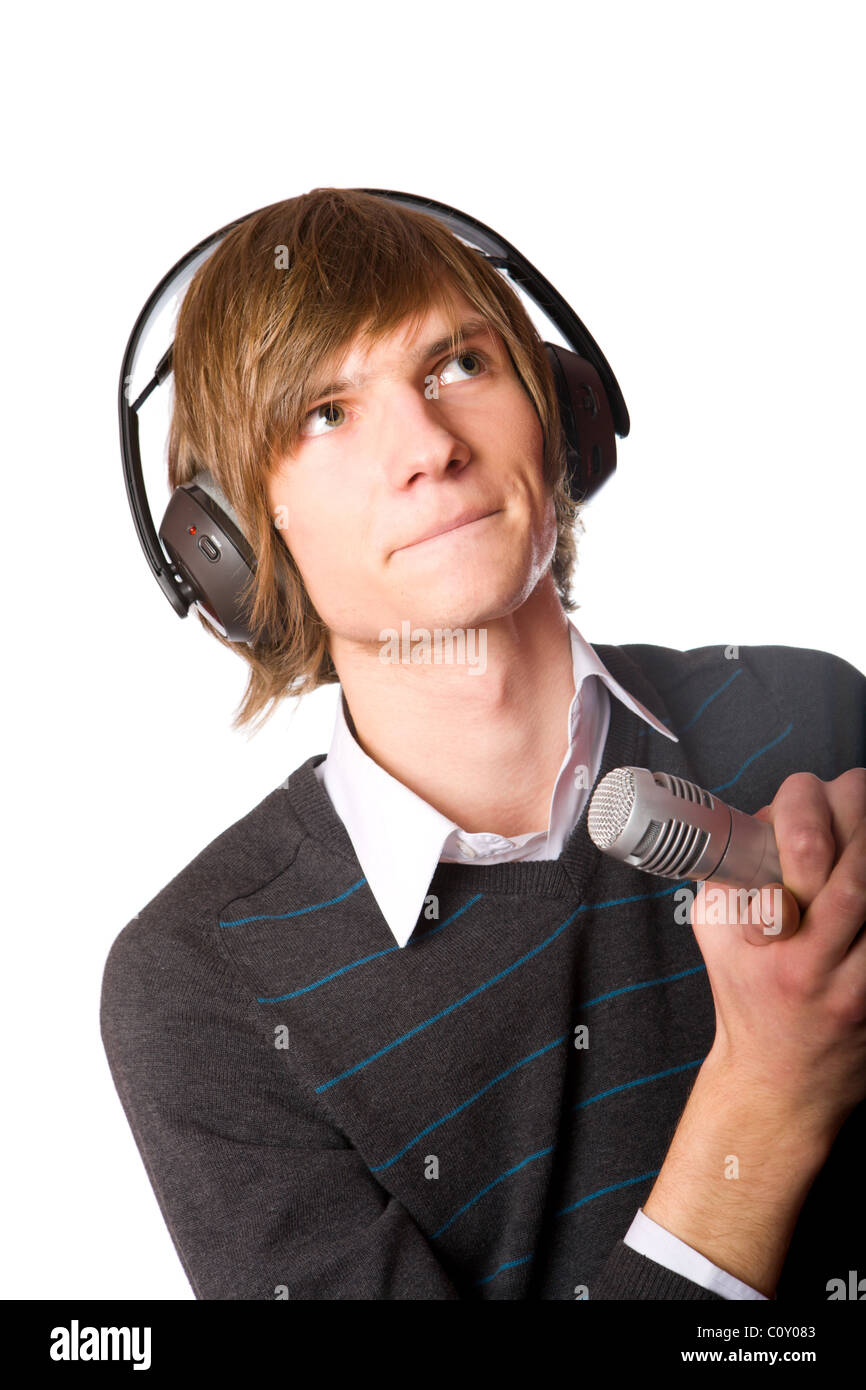 Young man singing wearing headphones isolated on white Stock Photo - Alamy