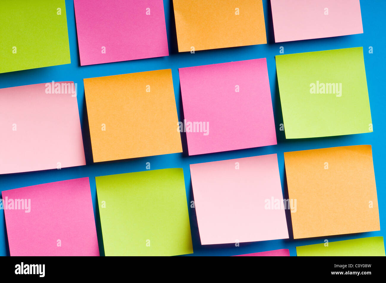Reminder notes on the bright colorful paper Stock Photo - Alamy