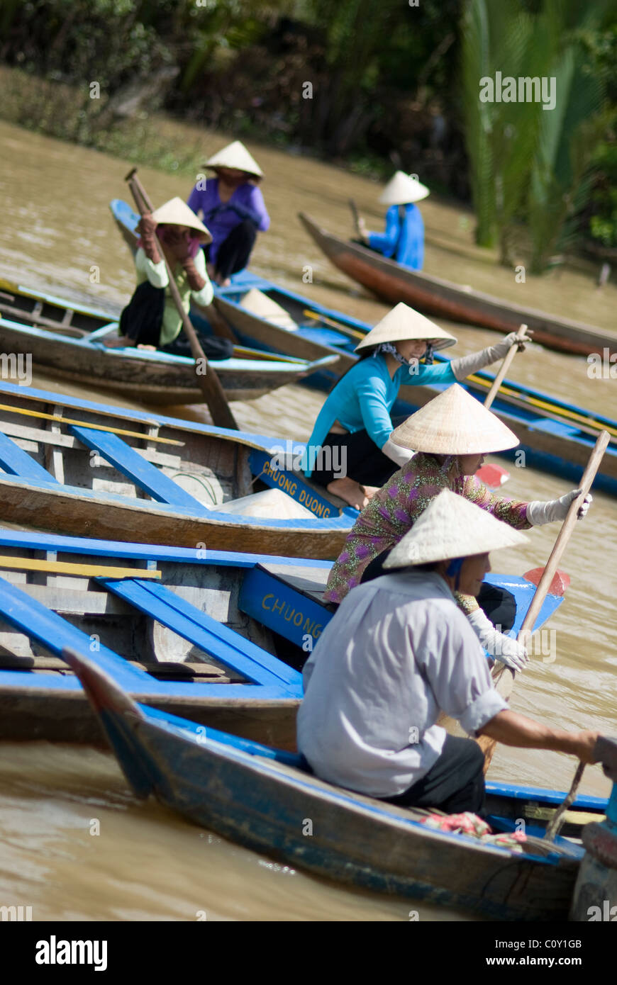 Women on boats in Mekong Delta Stock Photo - Alamy