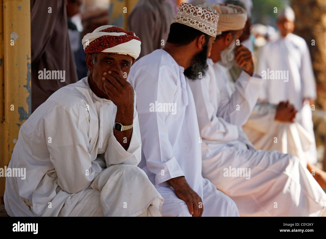 Omani men sitting hi-res stock photography and images - Alamy