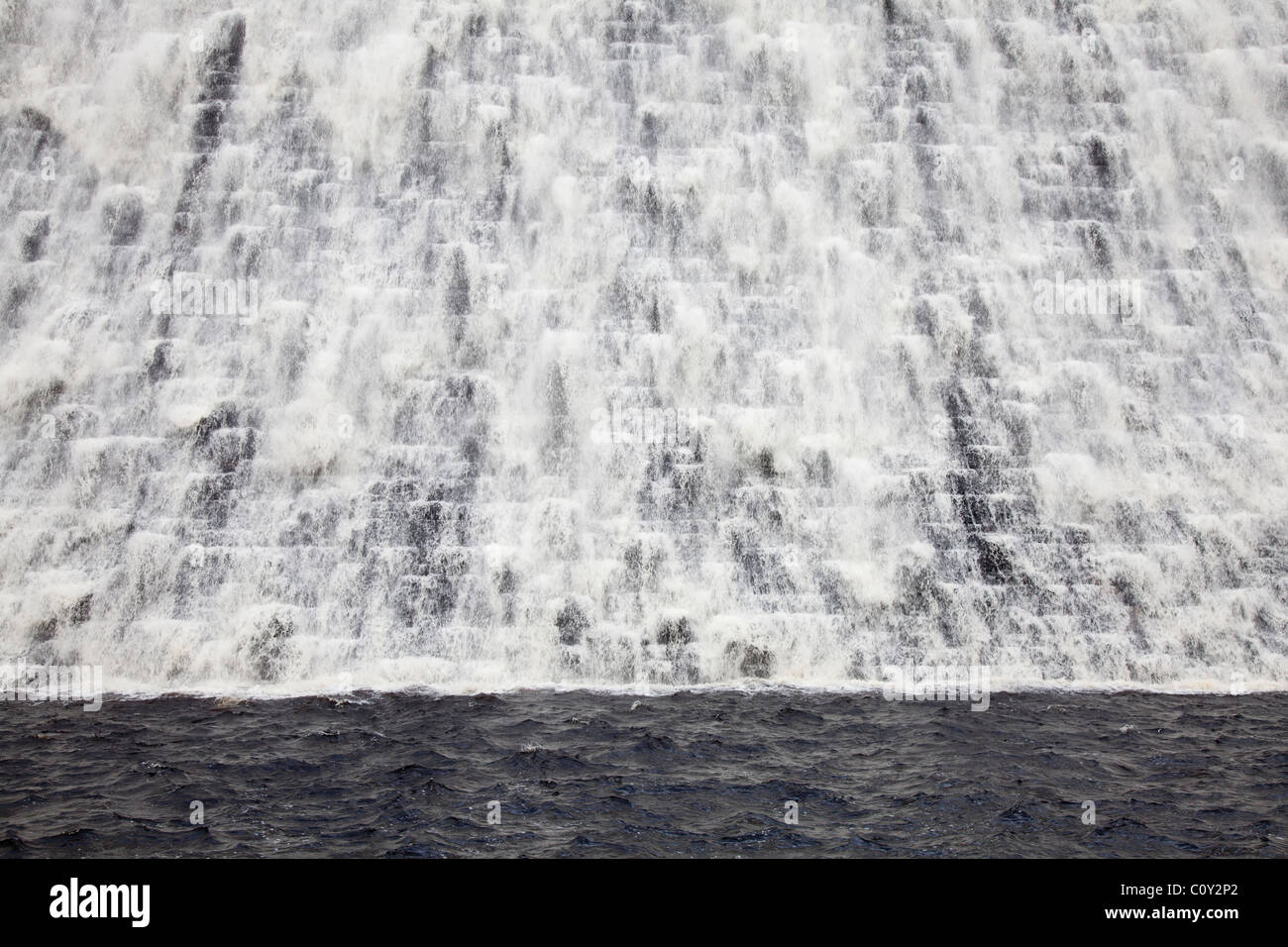 Water flowing down Howden Dam at Upper Derwent Valley Reservoir in the ...