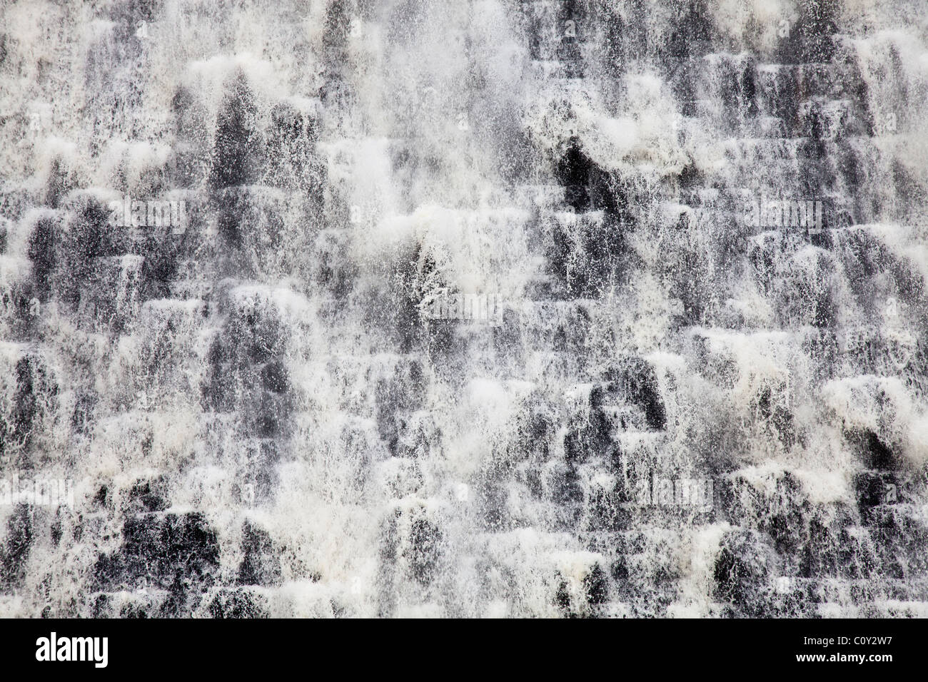 Water flowing down Howden Dam at Upper Derwent Valley Reservoir in the ...