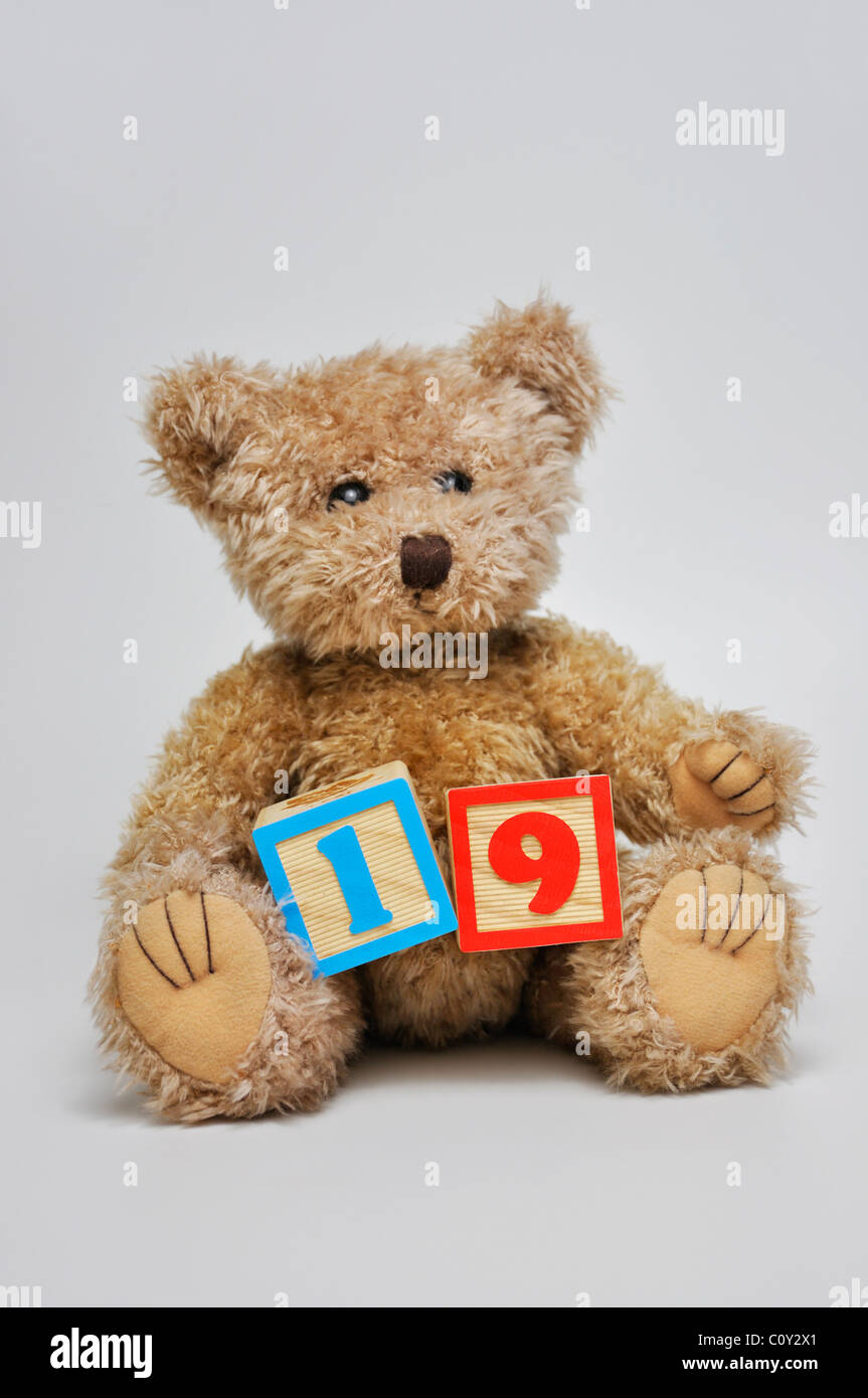 Teddy bear with cubes Stock Photo - Alamy