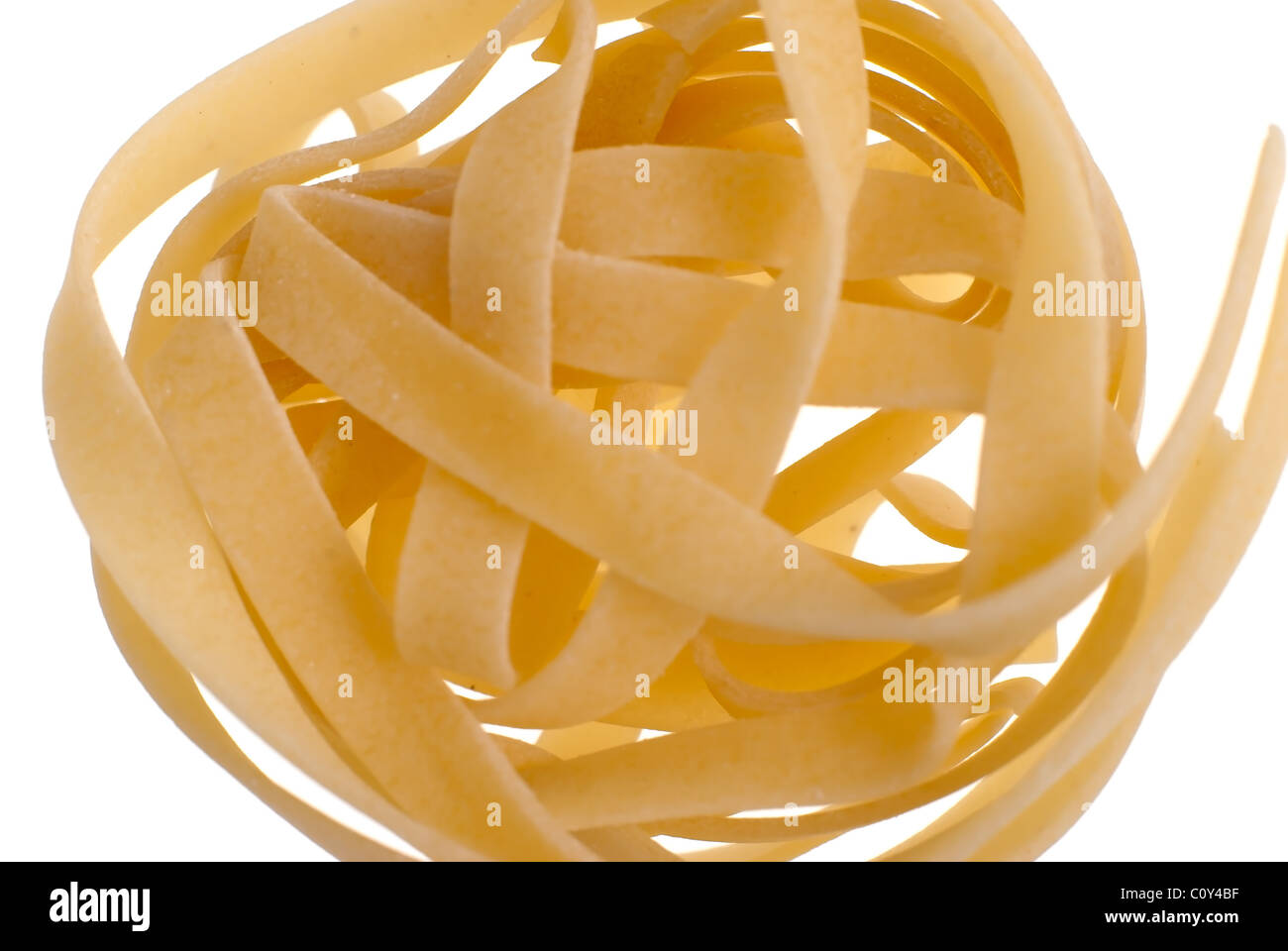 Italian pasta tagliatelle selective focus macro detail isolated on ...