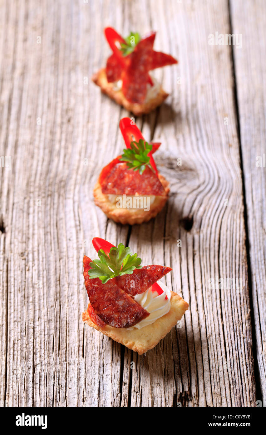 Shortcrust pastry based canapes with kielbasa - closeup Stock Photo - Alamy