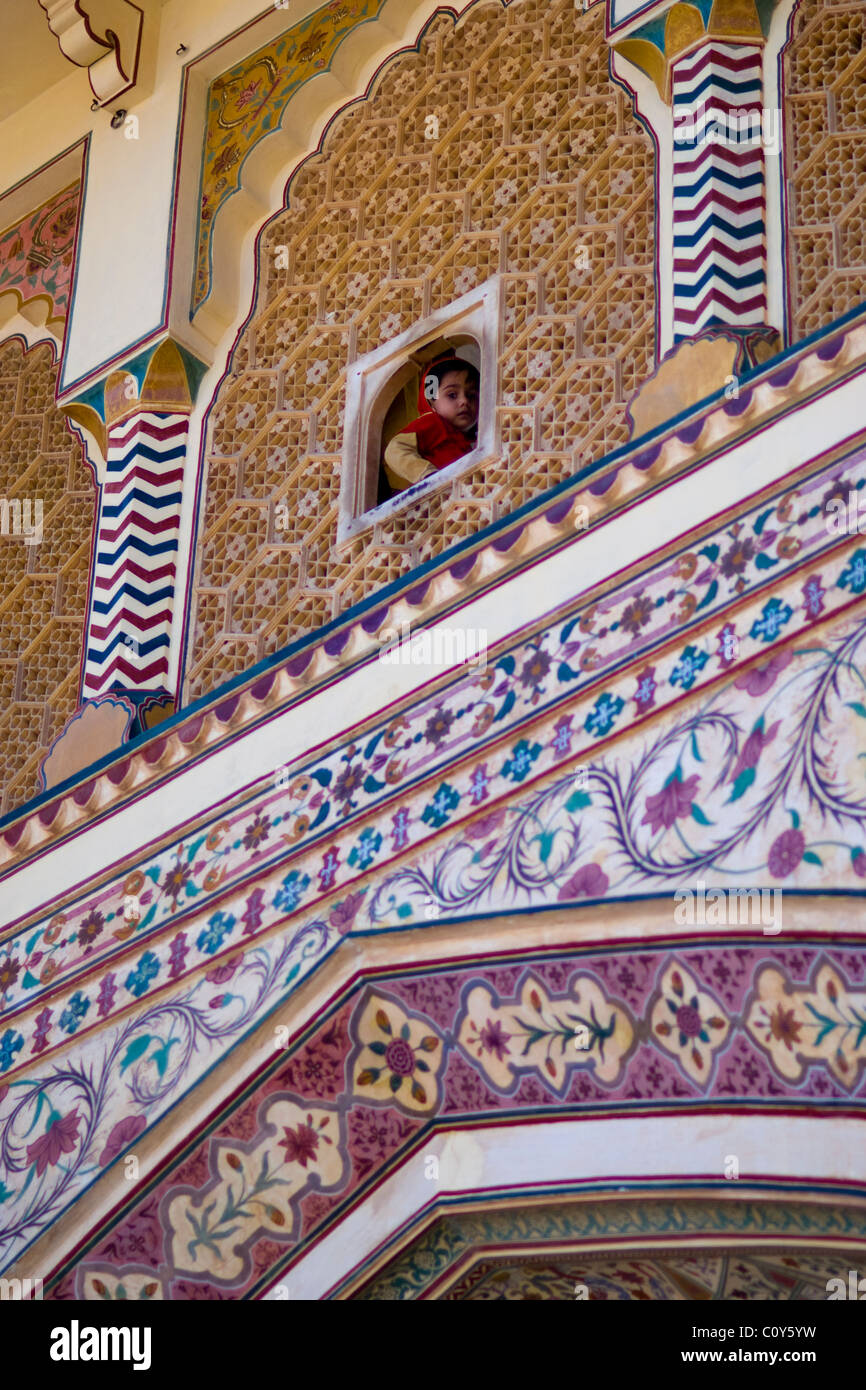 A little boy in a window frame in Amber Fort Stock Photo - Alamy