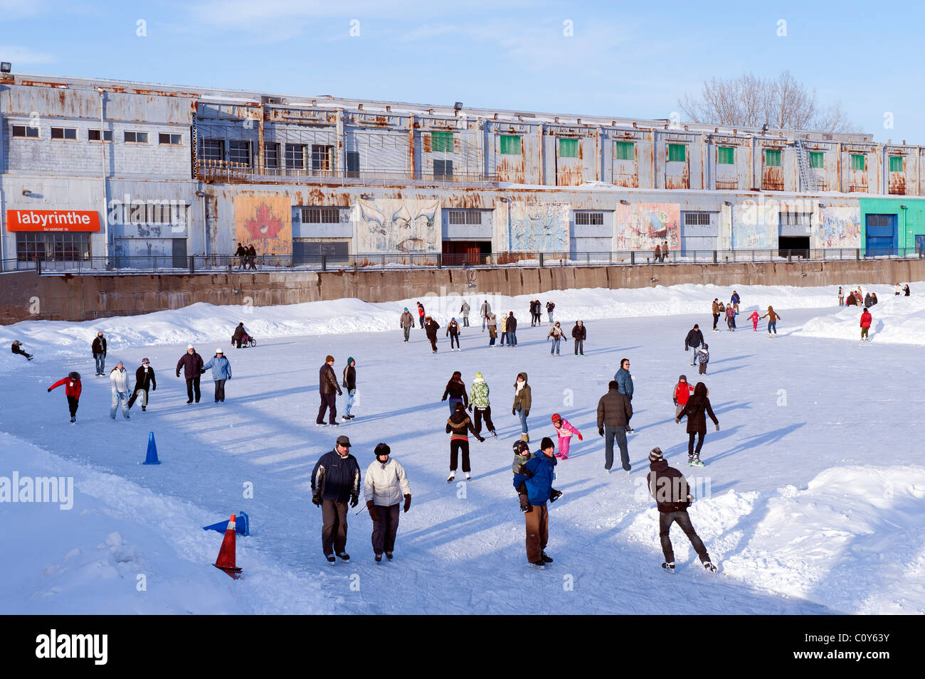 Ice skaters on frozen Bonsecours basin, Old Montreal, province of ...