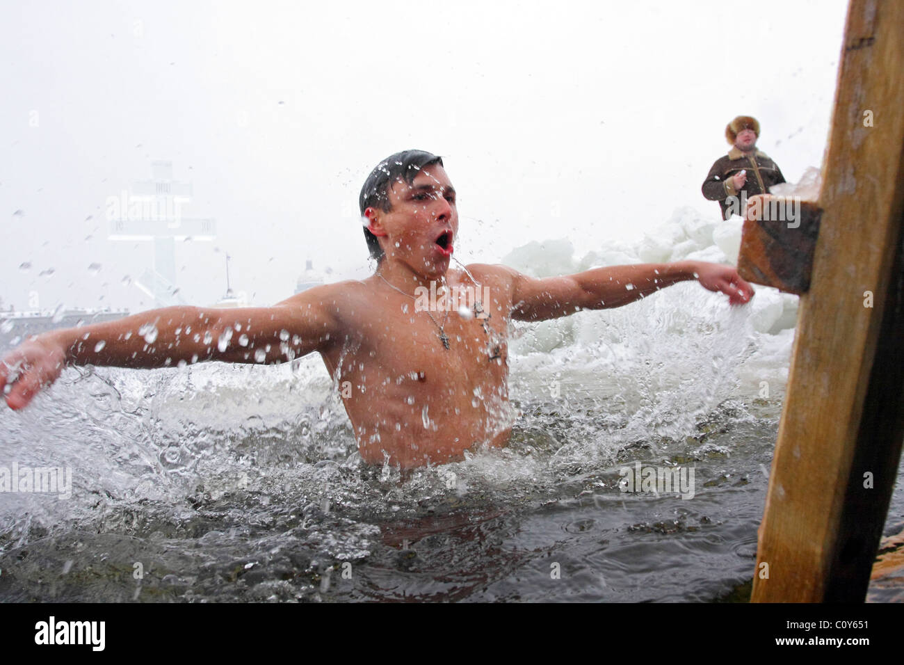 Orthodox believers celebrate Epiphany at Neva river dips in icy cold ...