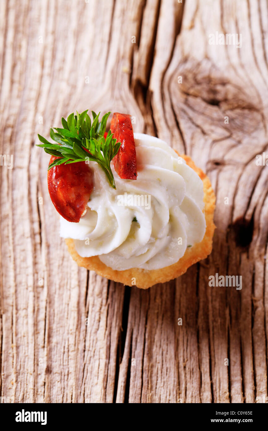 Canape - Pastry base with savory spread topping and salami Stock Photo ...