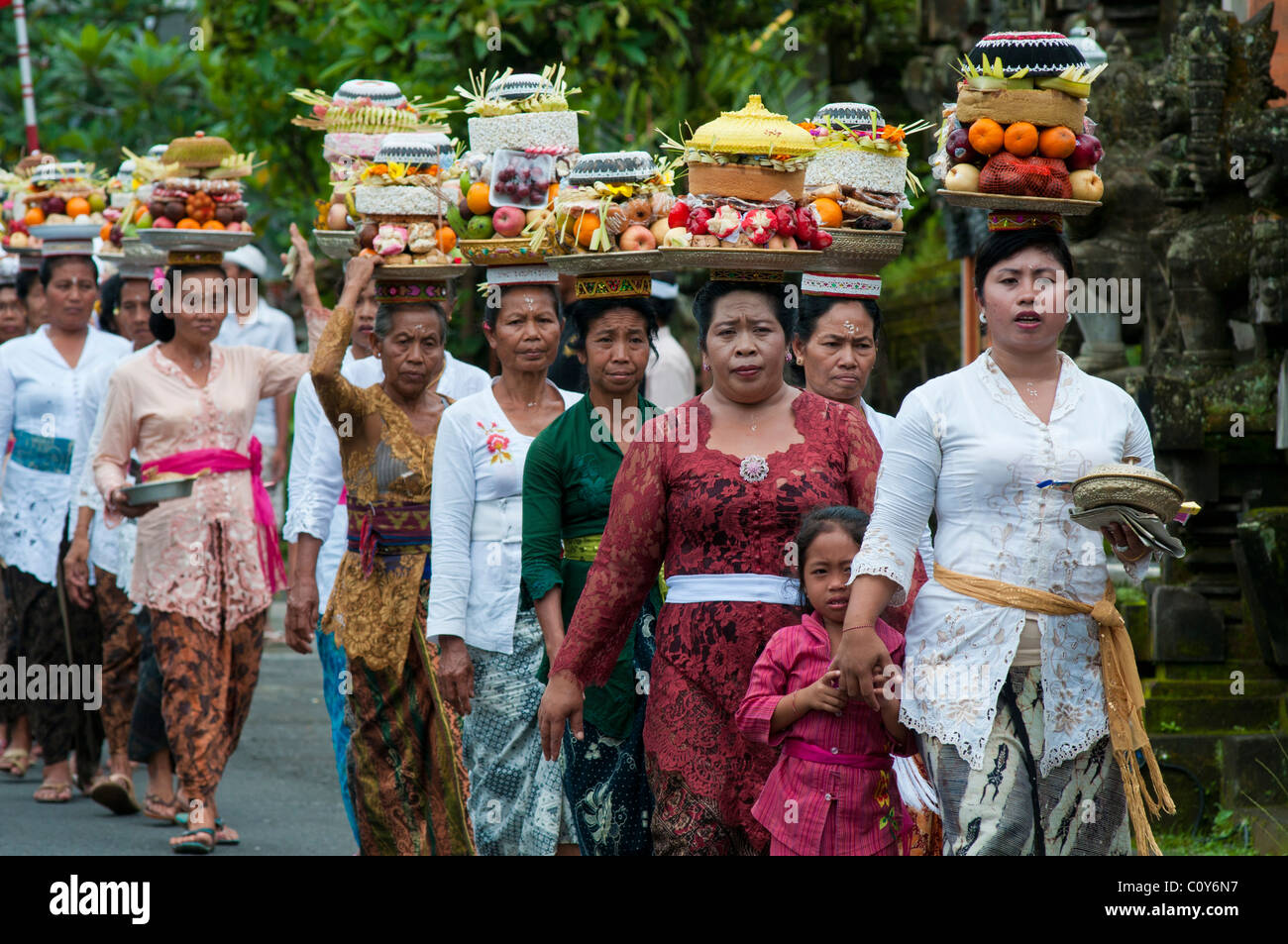 A traditional Hindu temple festival procession in central Bali ...