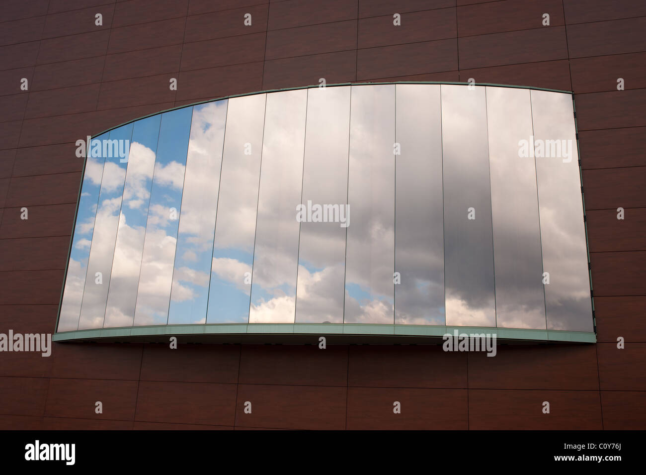 Convex mirroring window on a wooden facade Stock Photo - Alamy