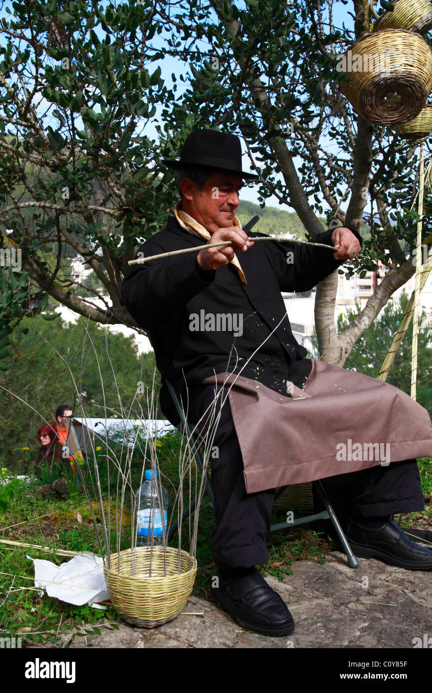 Man making baskets at a traditional Handicraft Fair, Ibiza, Spain Stock ...