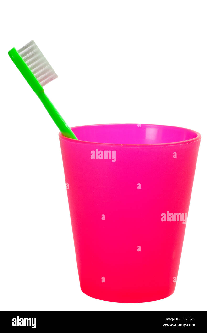 Toothbrush and cup for kids isolated on white background Stock Photo ...