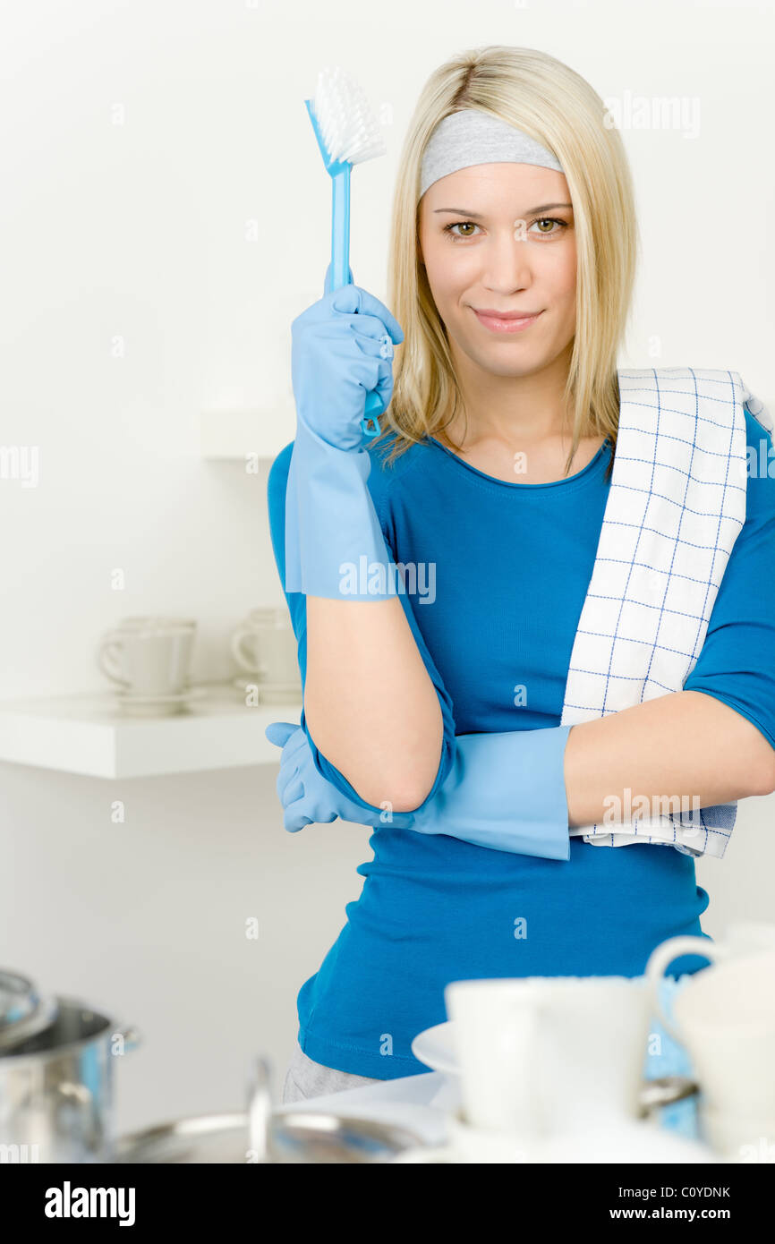 Modern kitchen - happy woman washing dishes, housework Stock Photo - Alamy