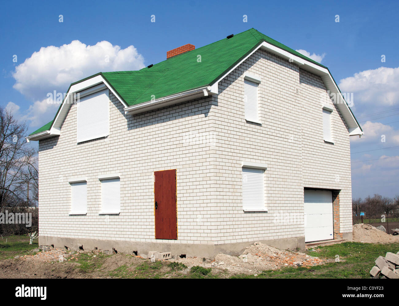 Unfinished building with blue sky Stock Photo - Alamy
