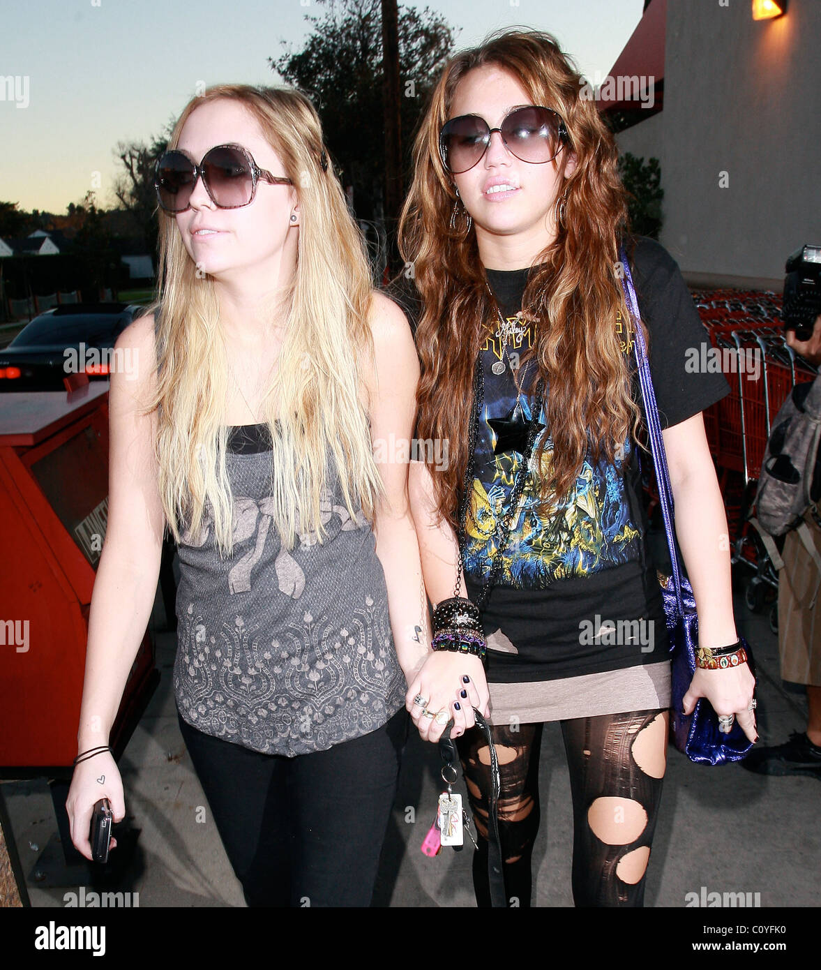 Miley Cyrus and her friend visit a nail salon in North Hollyood Mall ...